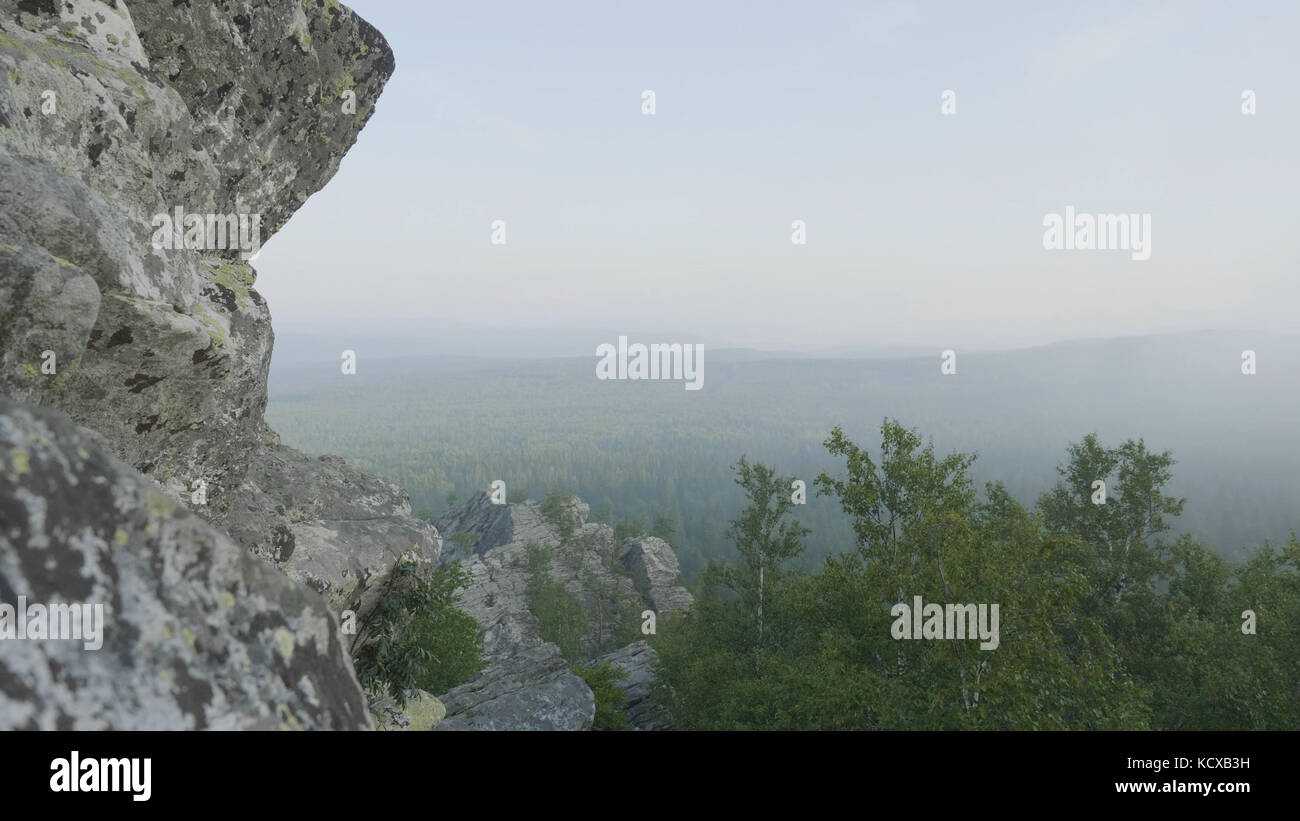 Outdoor natural landscape perspective. Massive rocks and view to the ...