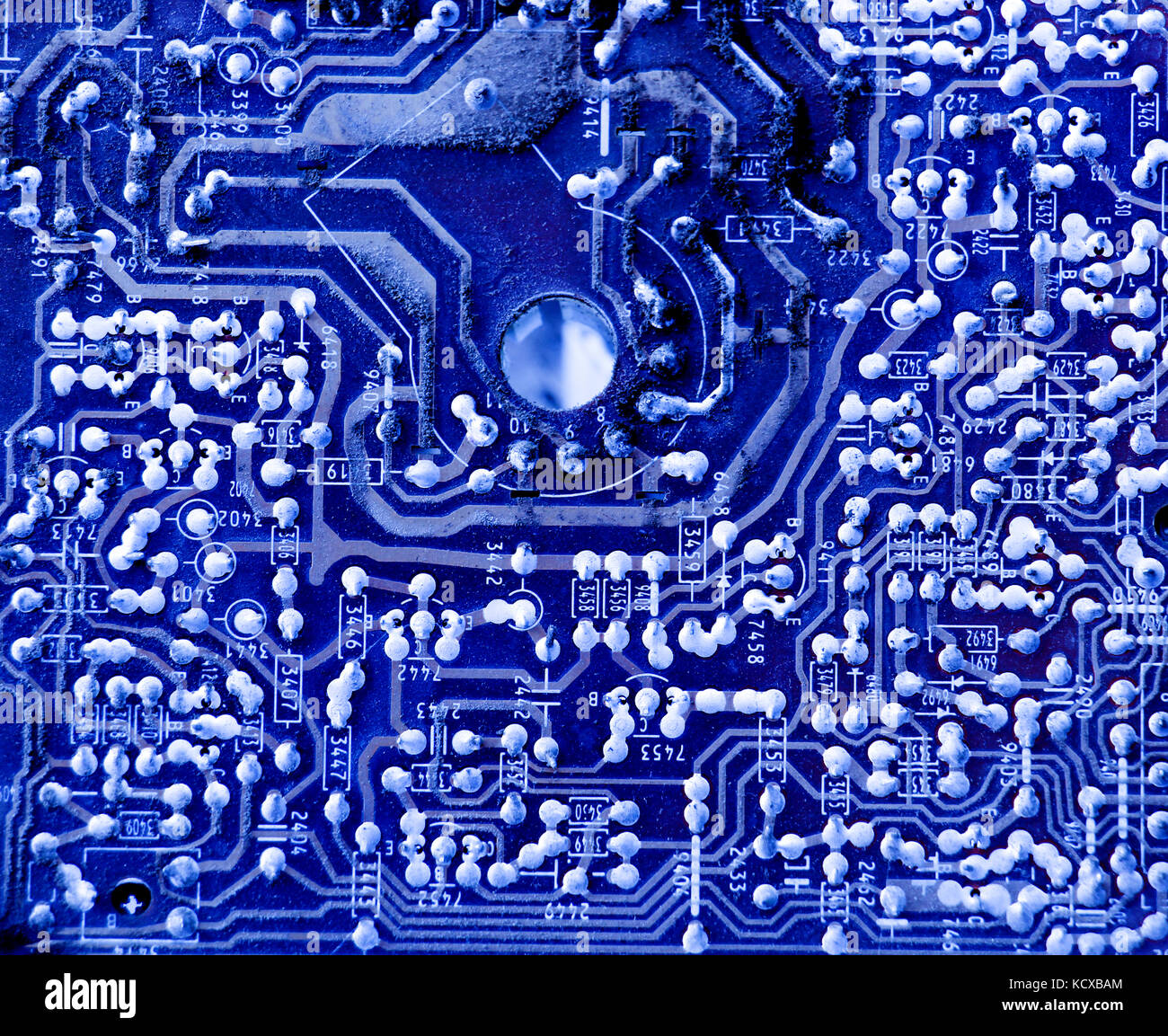 Part of old vintage printed circuit board with electronic components ...