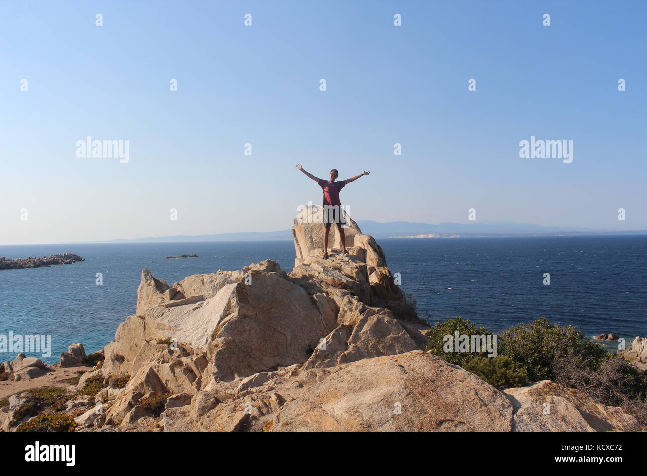 Standing atop rock hi-res stock photography and images - Alamy