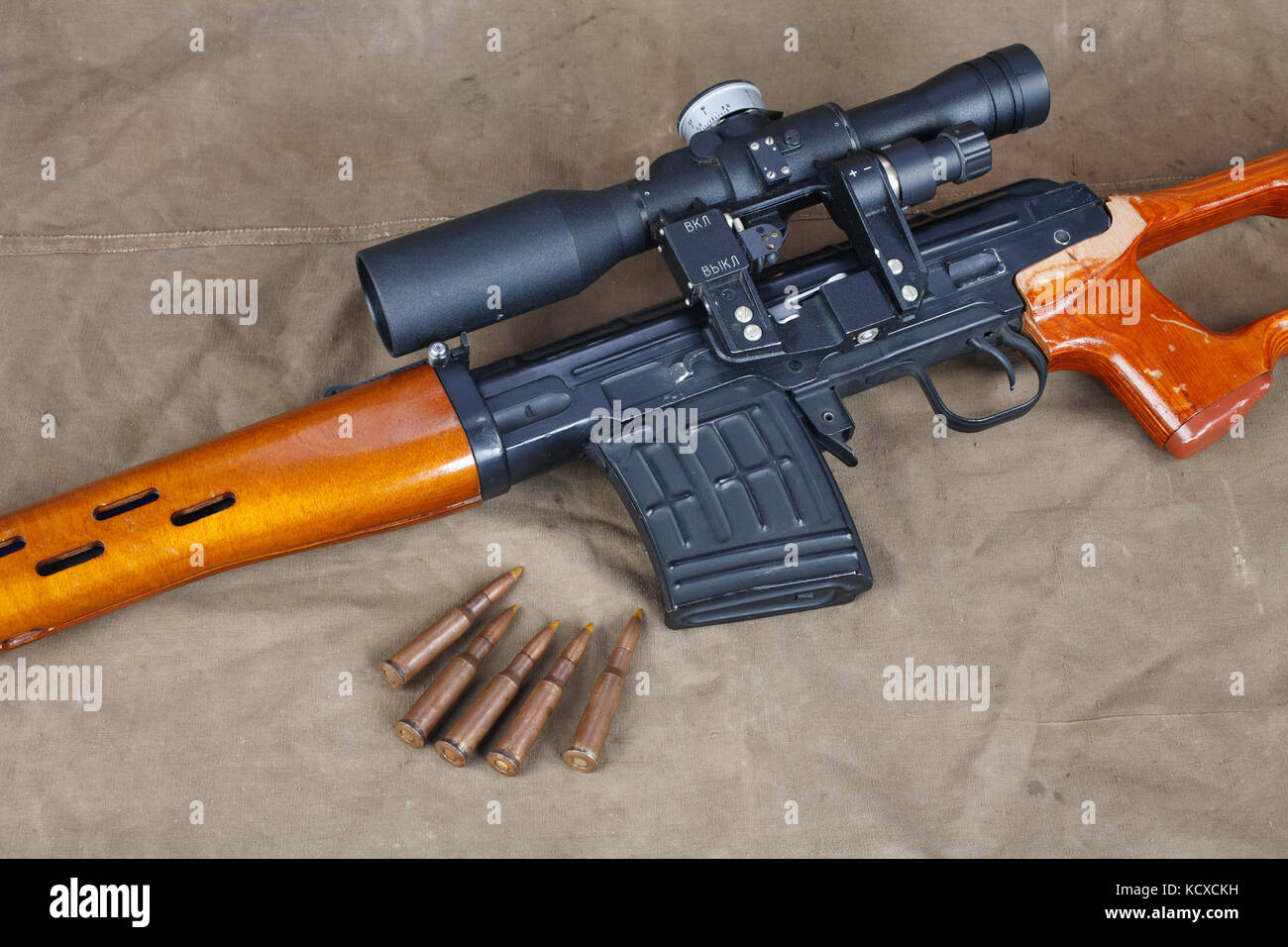 SVD sniper rifle on khaki canvas background Stock Photo - Alamy