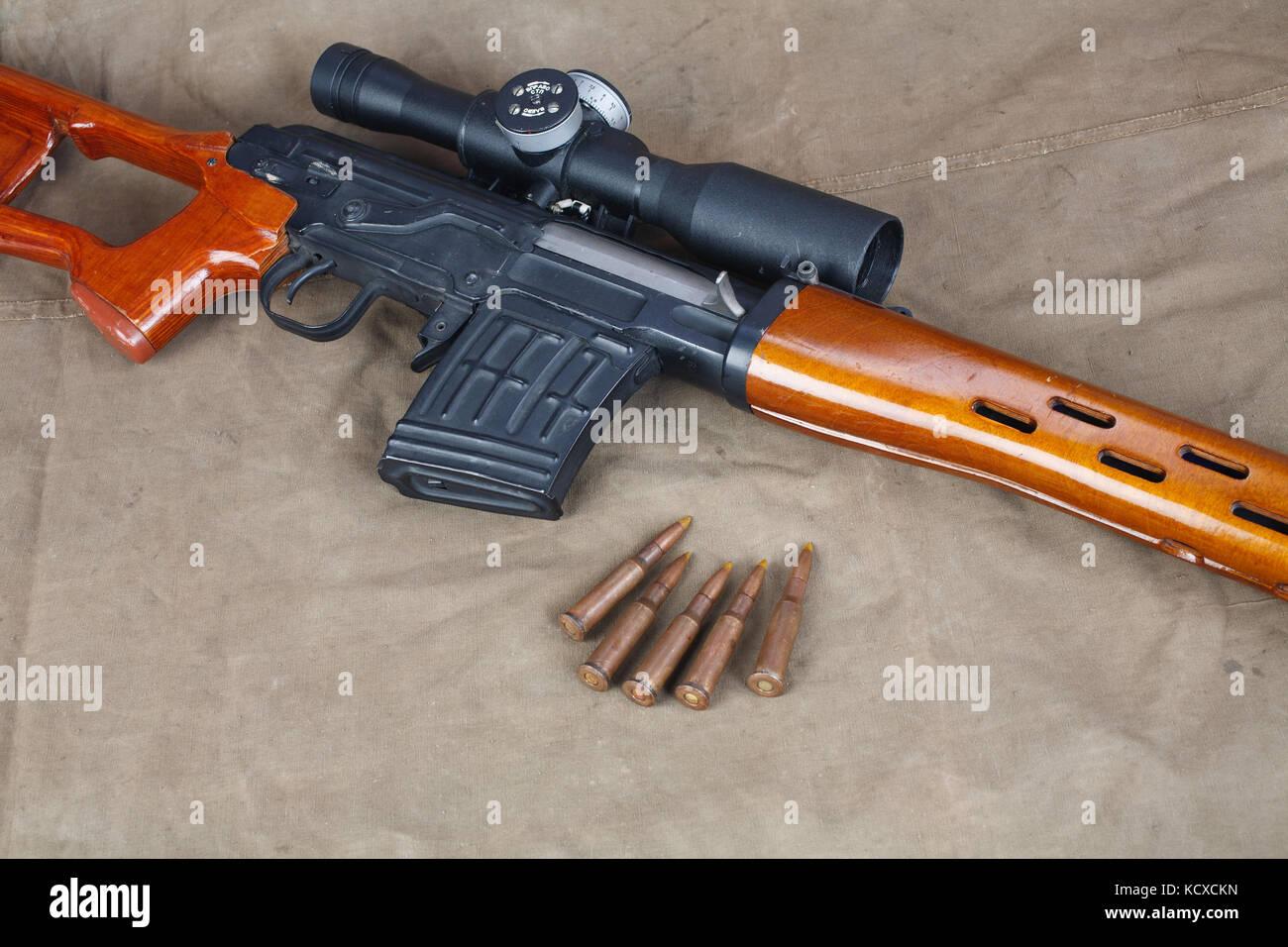 SVD sniper rifle on khaki canvas background Stock Photo - Alamy