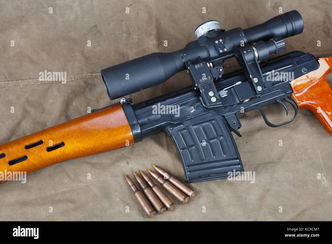 SVD sniper rifle on khaki canvas background Stock Photo - Alamy