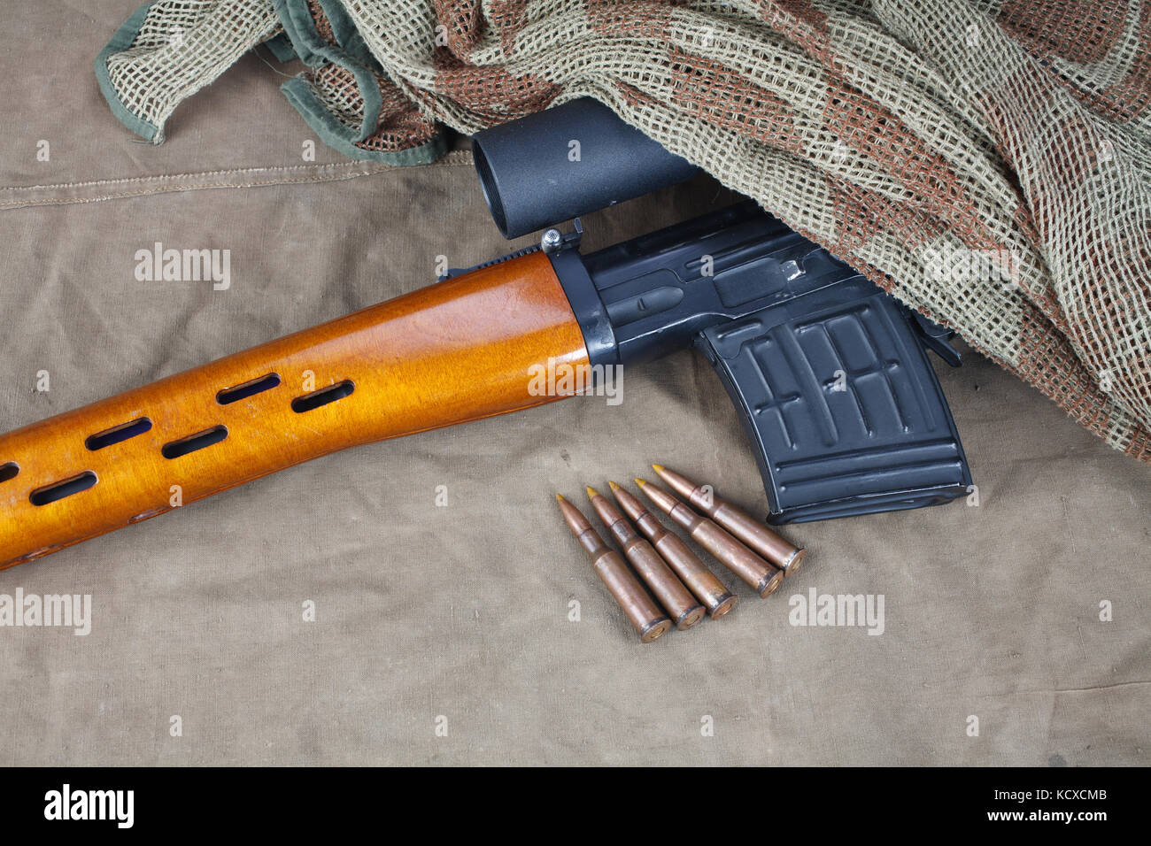SVD sniper rifle on khaki canvas background Stock Photo - Alamy