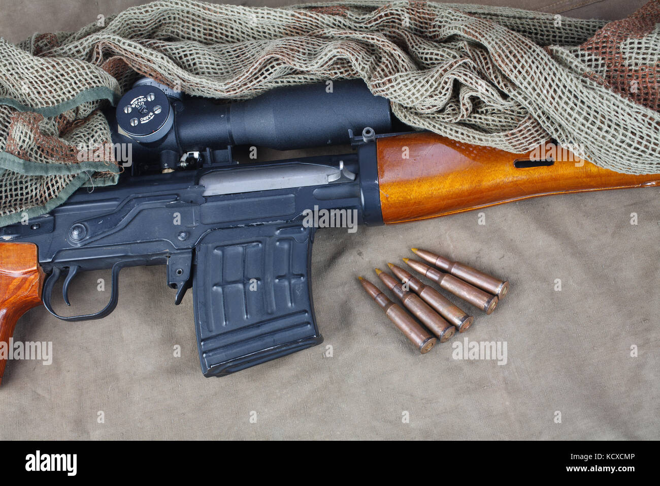 SVD sniper rifle on khaki canvas background Stock Photo - Alamy