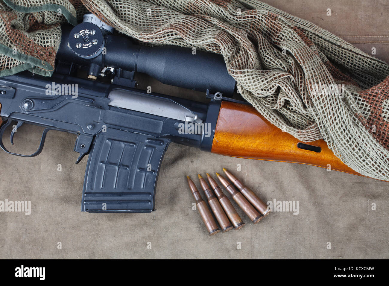 SVD sniper rifle on khaki canvas background Stock Photo - Alamy