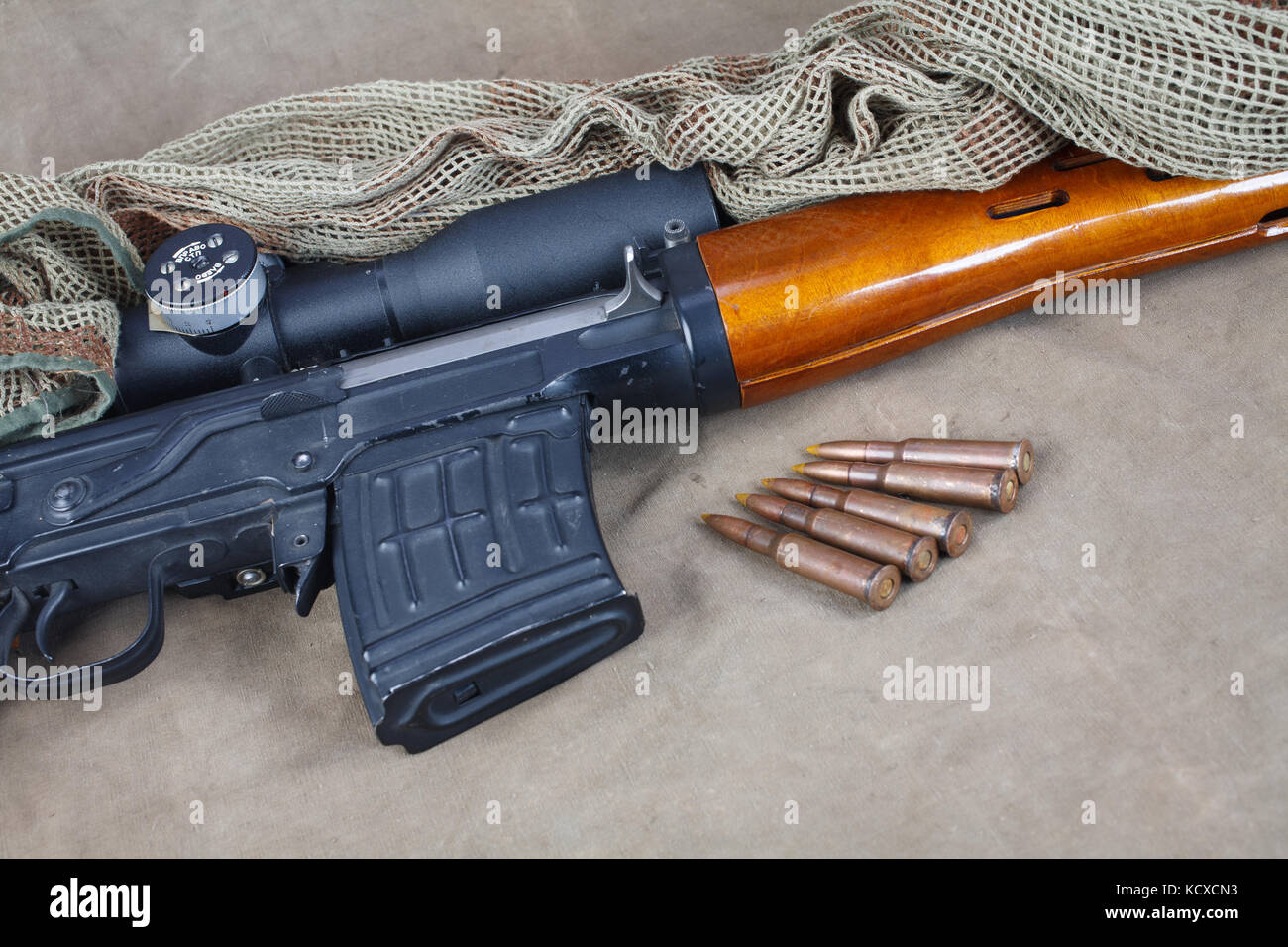 SVD sniper rifle on khaki canvas background Stock Photo - Alamy