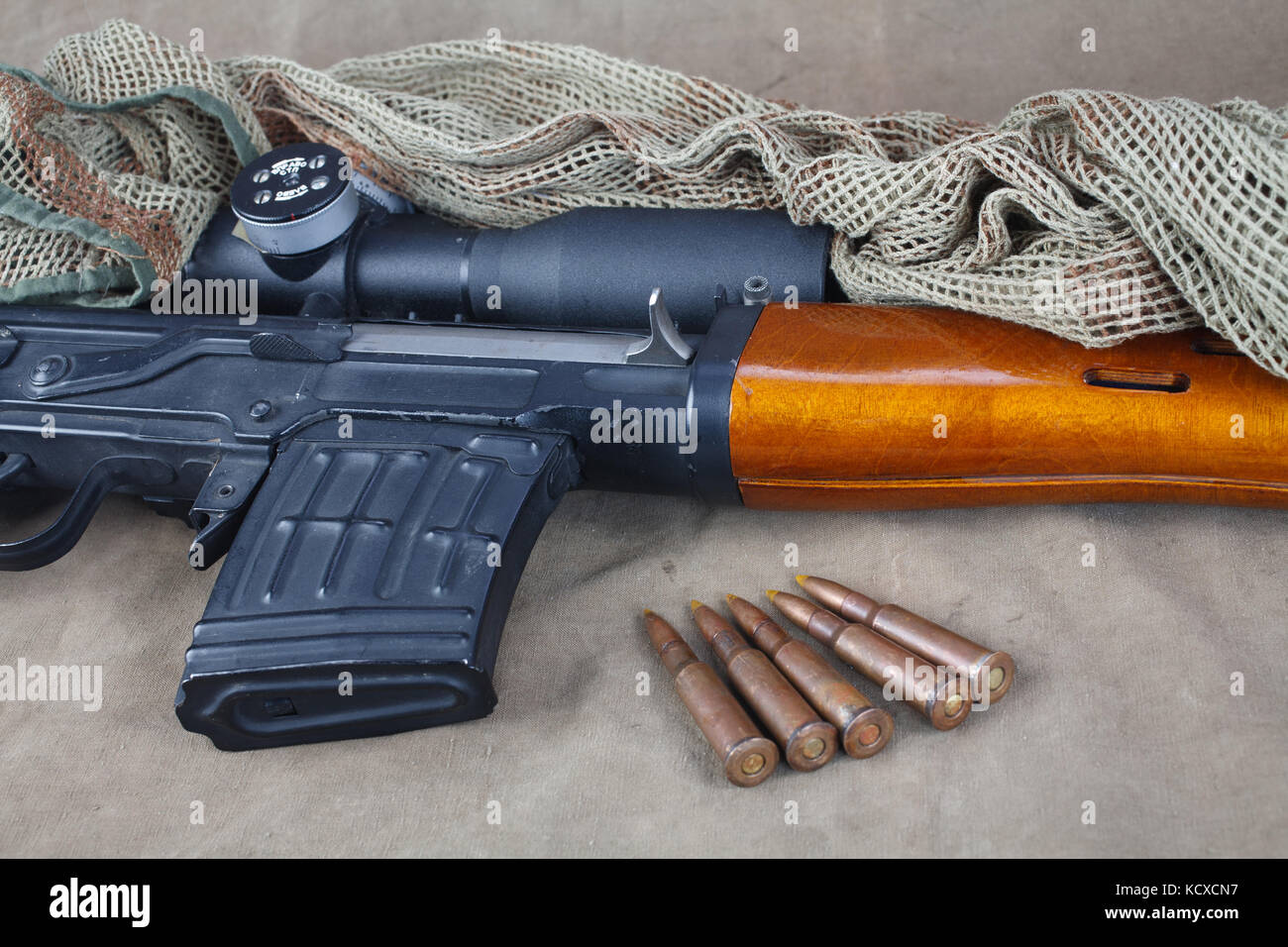 SVD sniper rifle on khaki canvas background Stock Photo - Alamy