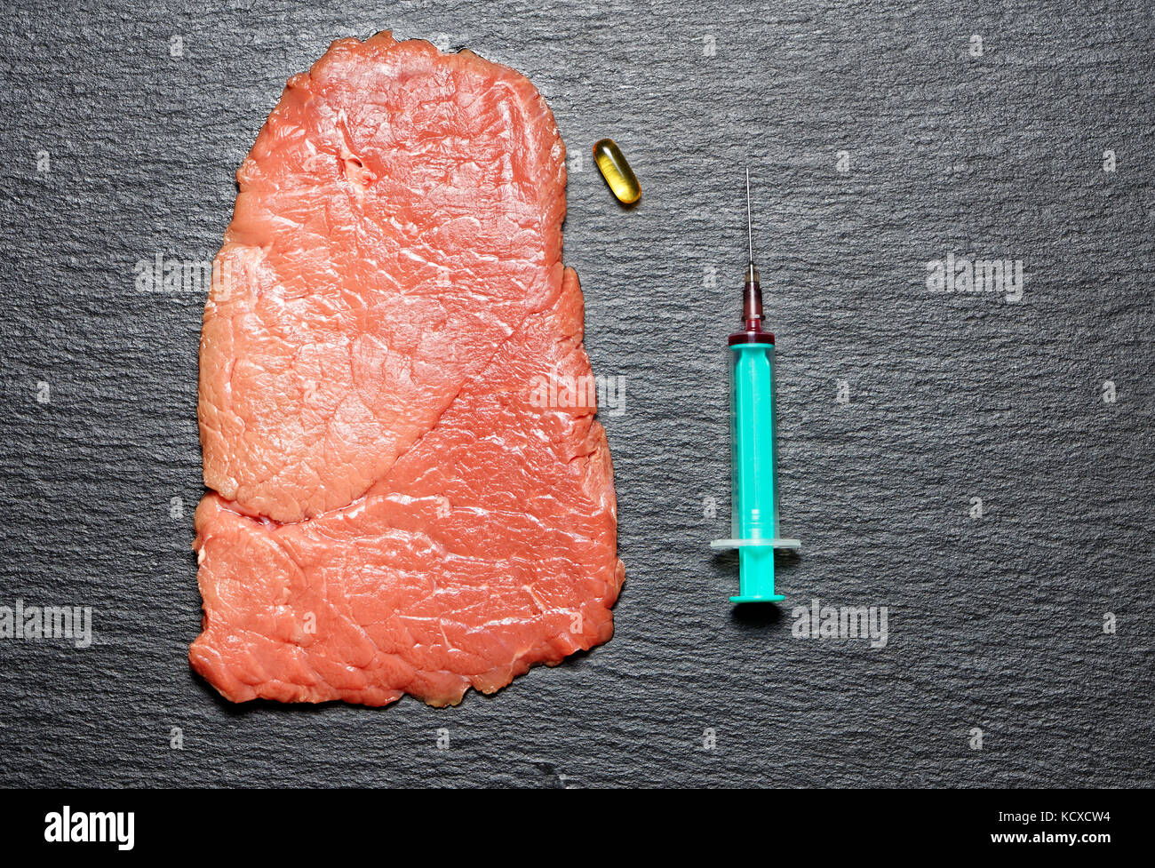 Food scientist injecting raw mea Stock Photo - Alamy