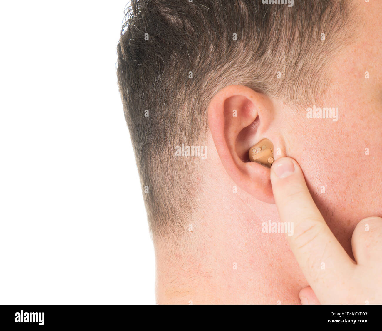 Man wearing hearing aid hi-res stock photography and images - Alamy