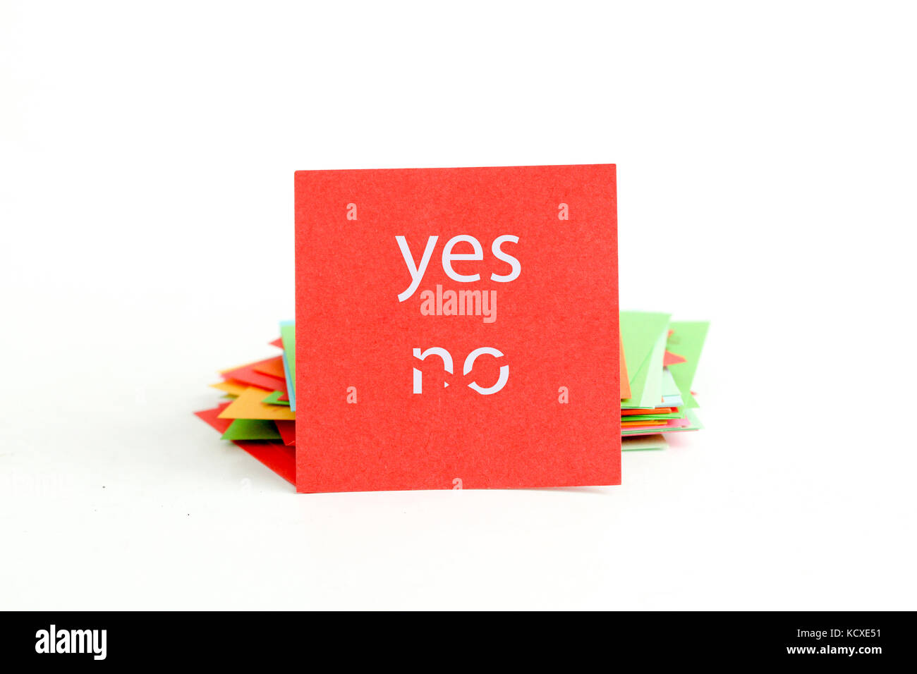 picture of a red note paper with text yes no Stock Photo - Alamy