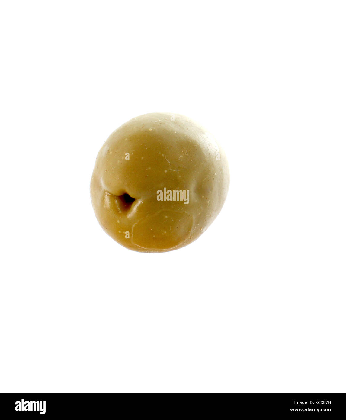 picture of a single pickled olive on white background Stock Photo - Alamy