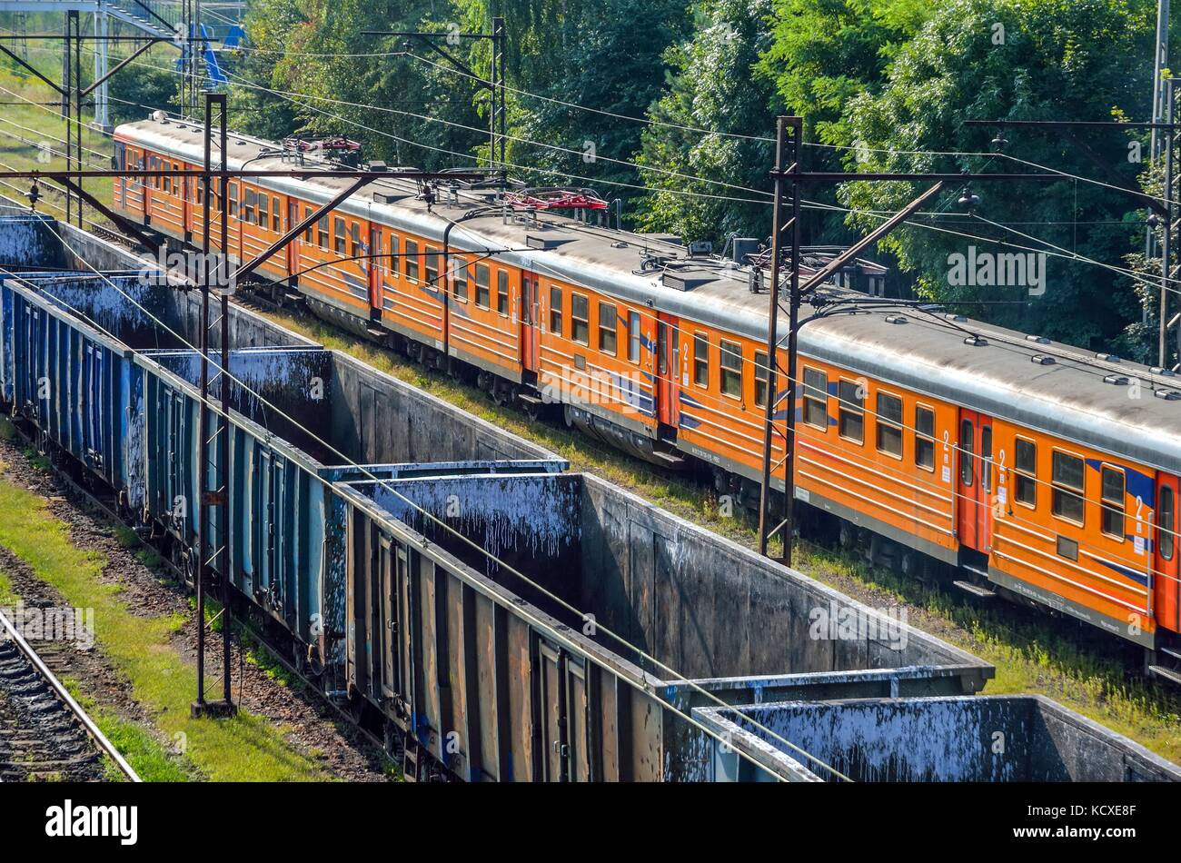 TRZEBINIA, POLAND - AUGUST 19, 2017: Freight and passenger train at the ...