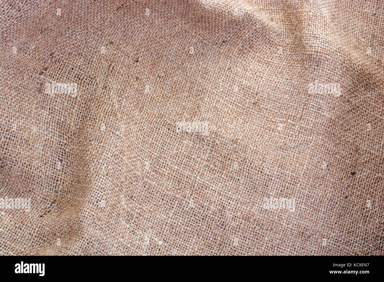 wrinkled Hessian sack cloth or gunny sack, selective focus Stock Photo ...