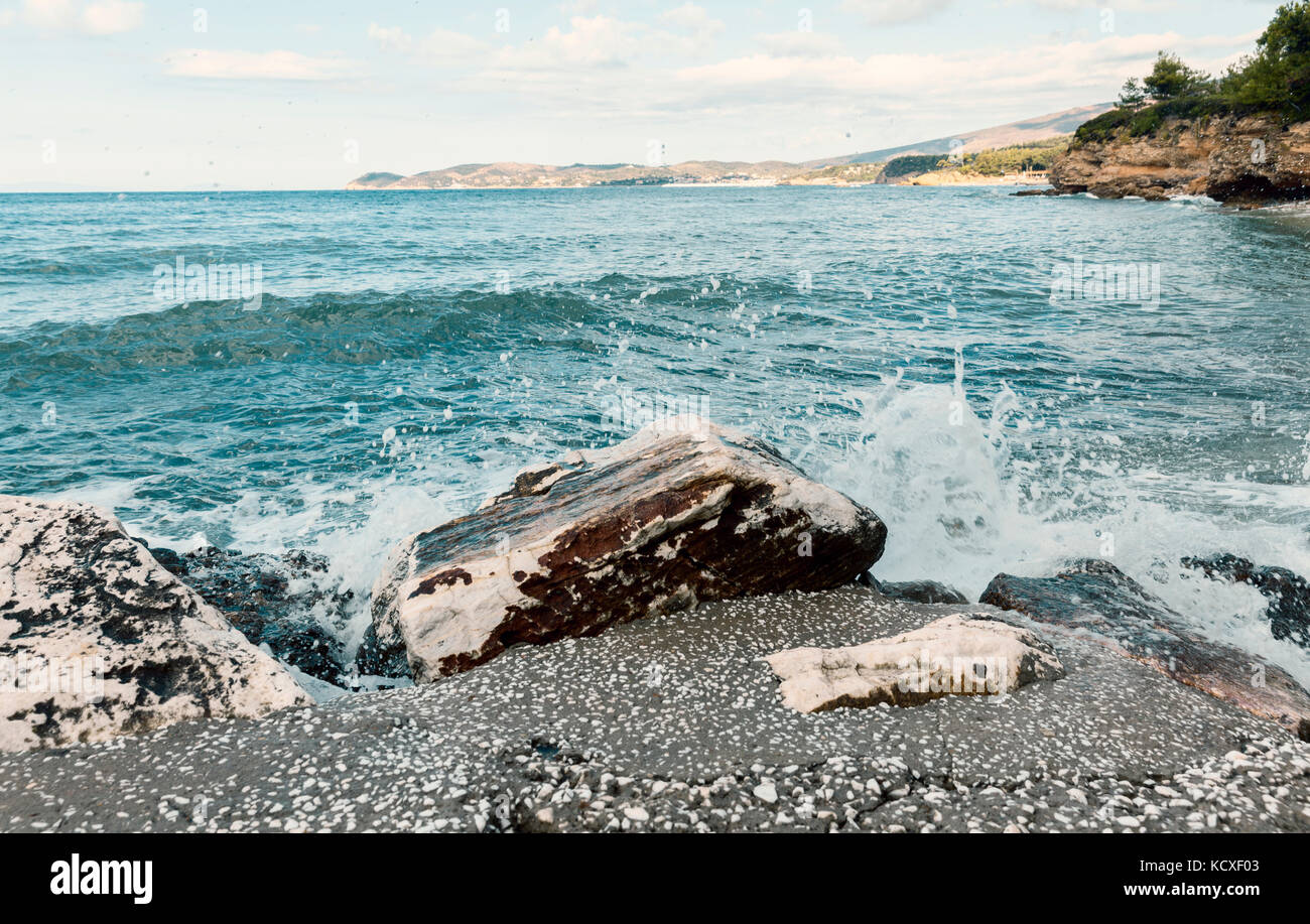 water splashing in blue sea Stock Photo - Alamy