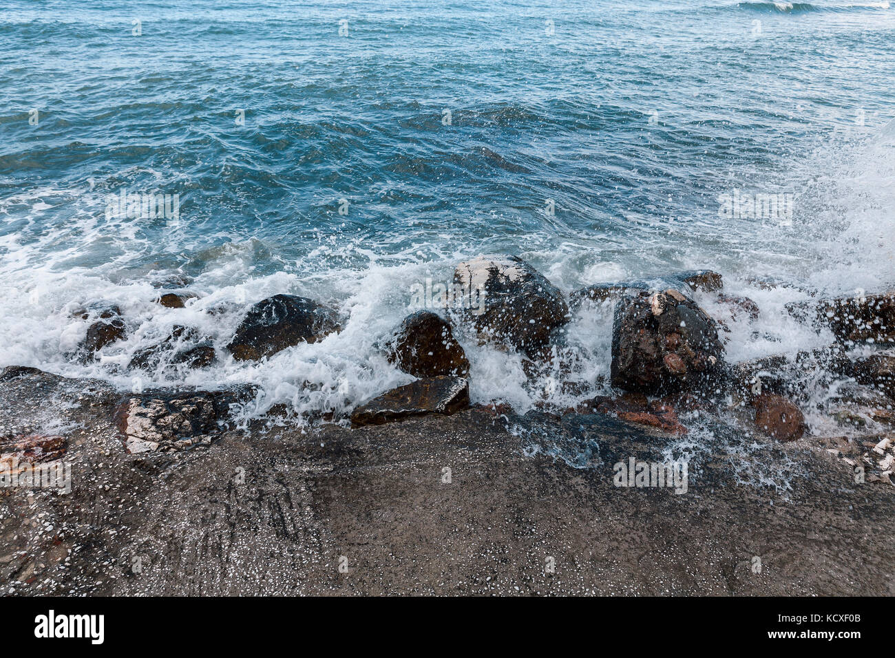 water splashing in blue sea Stock Photo - Alamy