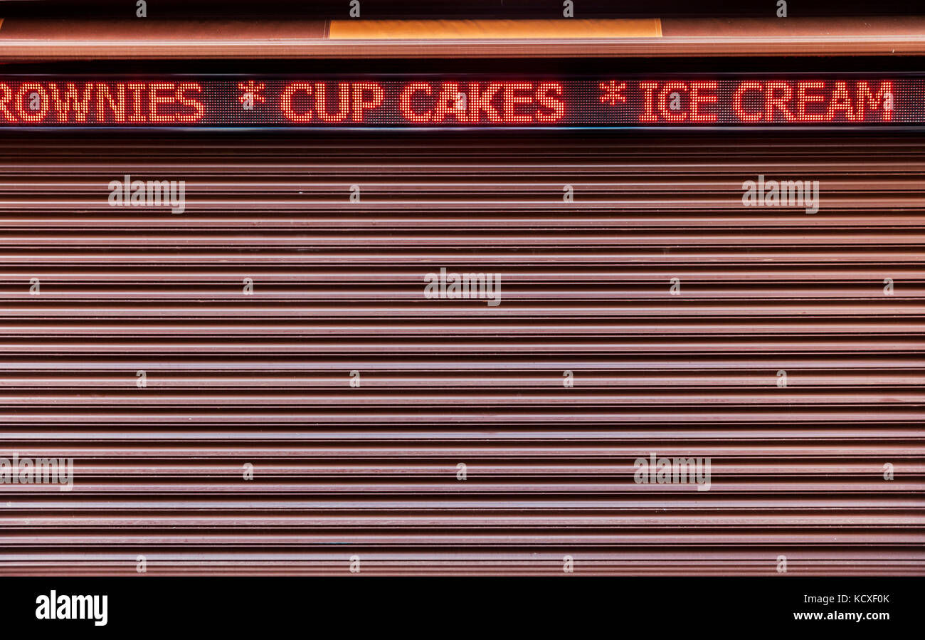 led display on closed store, with signs cup cake and ice cream Stock ...