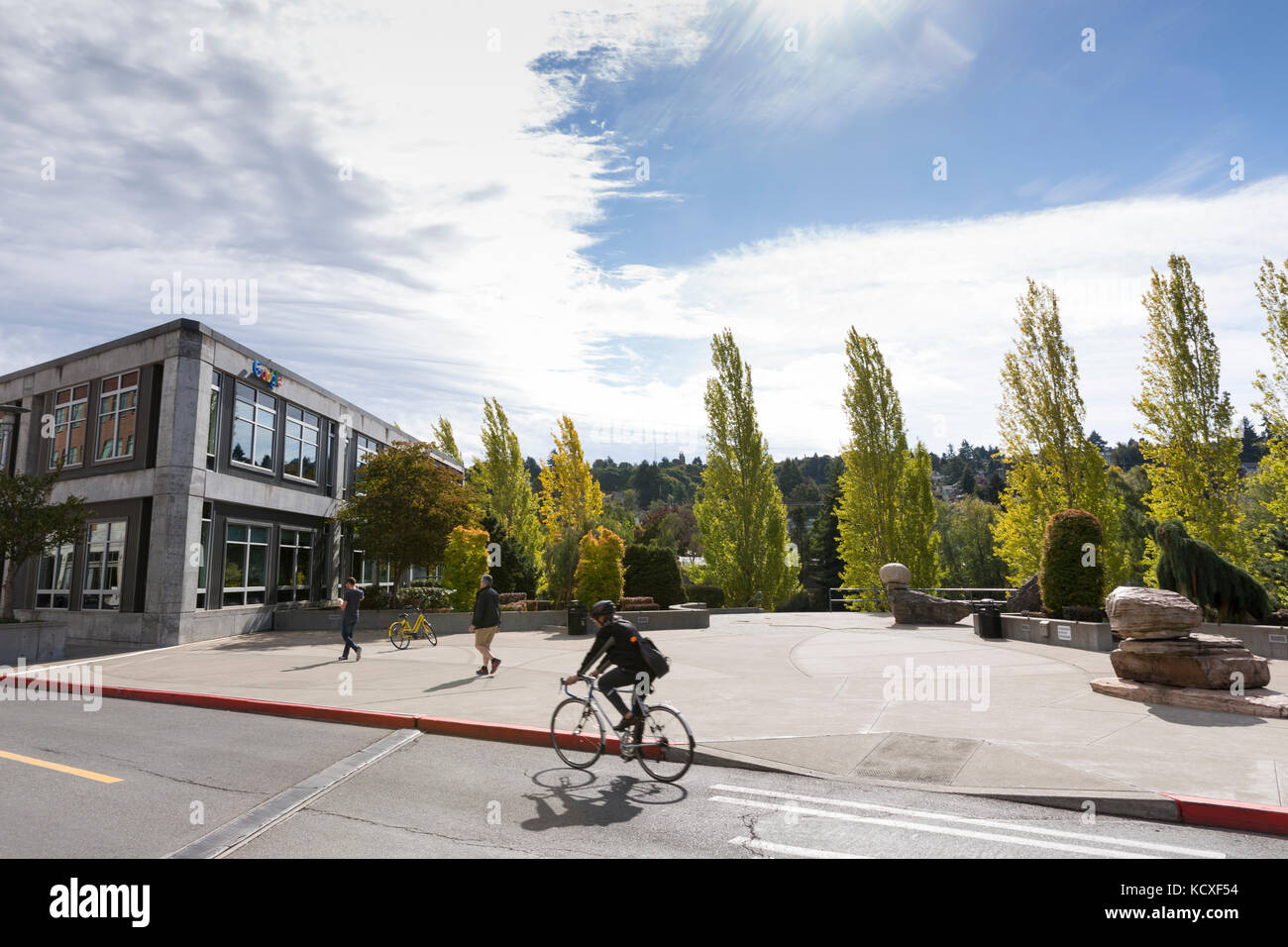 Seattle, Washington: Couple walking in Evanston Plaza at Google Seattle ...