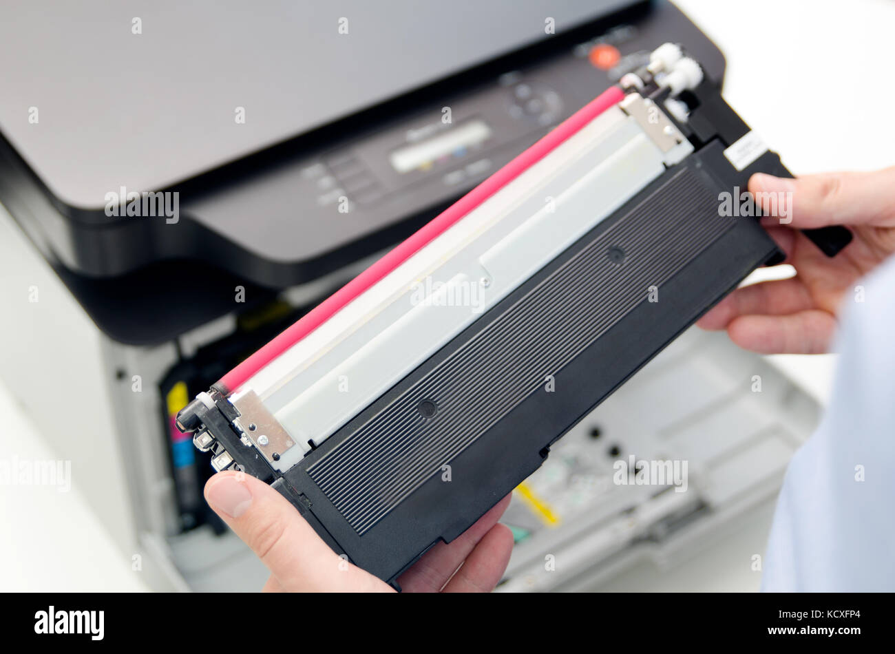 Man replacing toner in laser printer. toner printer cartridge print ...
