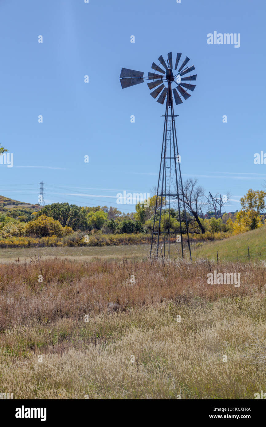 Old windmill with trees in the distance at the Schweiger Ranch Fall ...