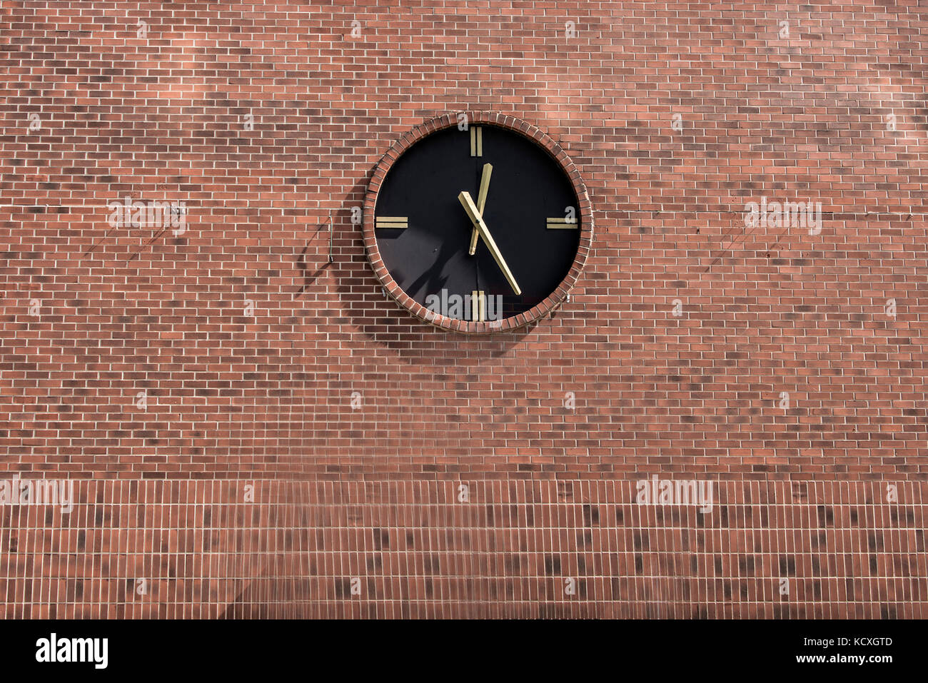 A Vintage Station Clock On A Red Brick Wall With Copy Space Stock Photo ...