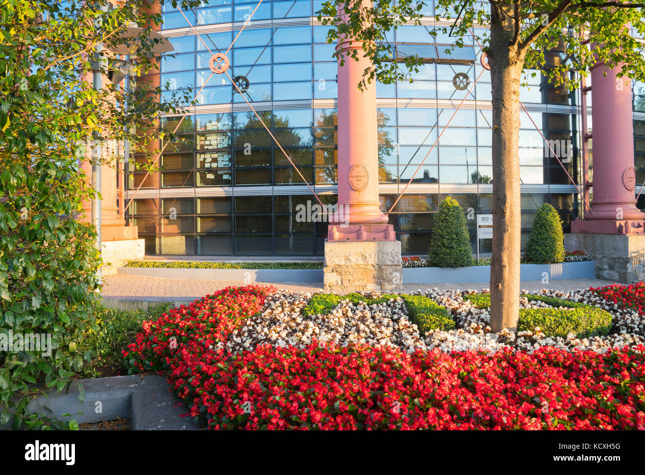 DUBLIN, IRELAND - AUGUST 9, 2017; Gardens in front redeveloped old ...