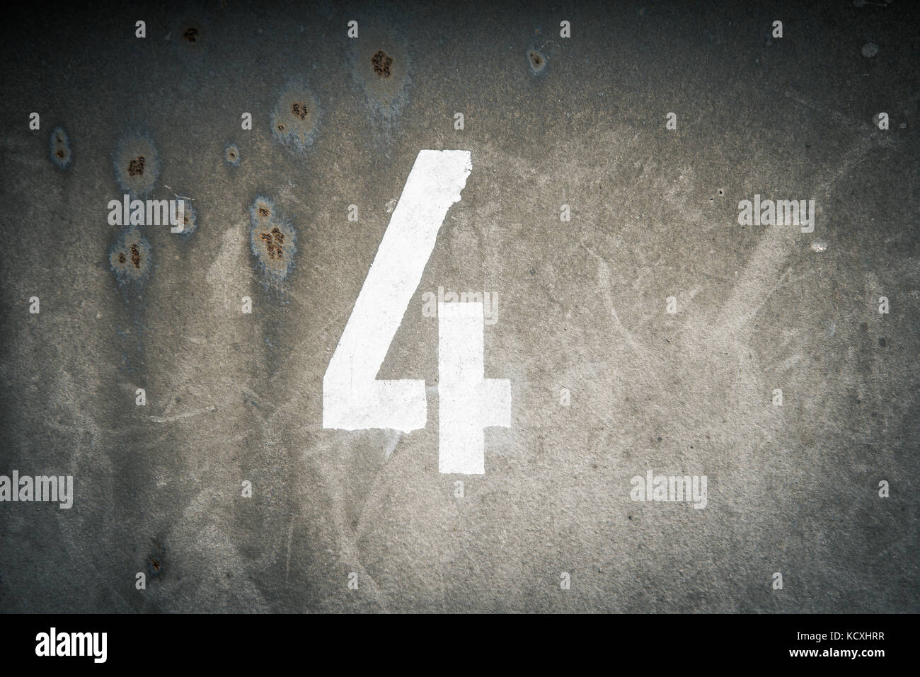 Number 4 four painted on a wall stencil Stock Photo - Alamy