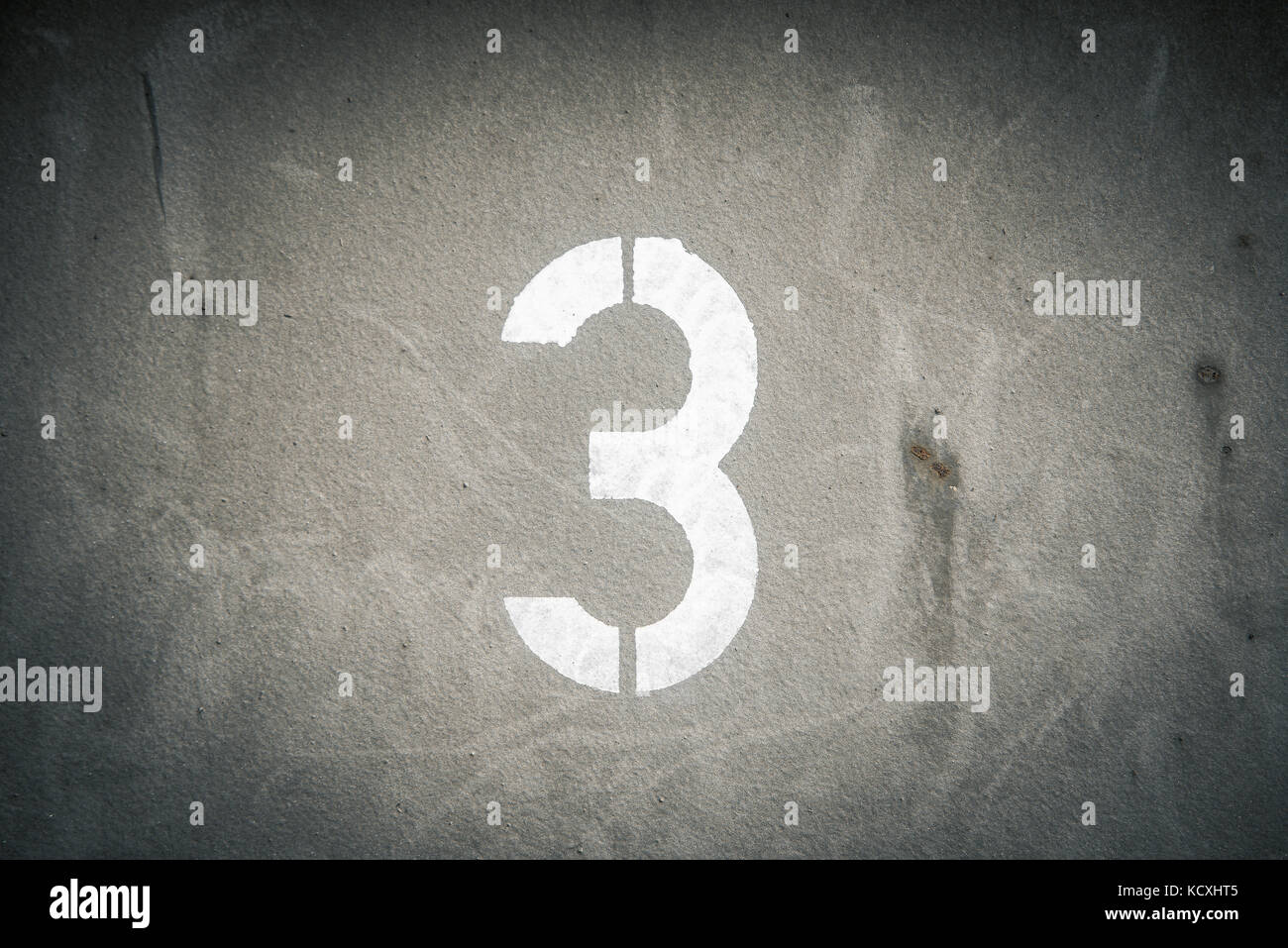 Number 3 three painted on a wall stencil Stock Photo - Alamy