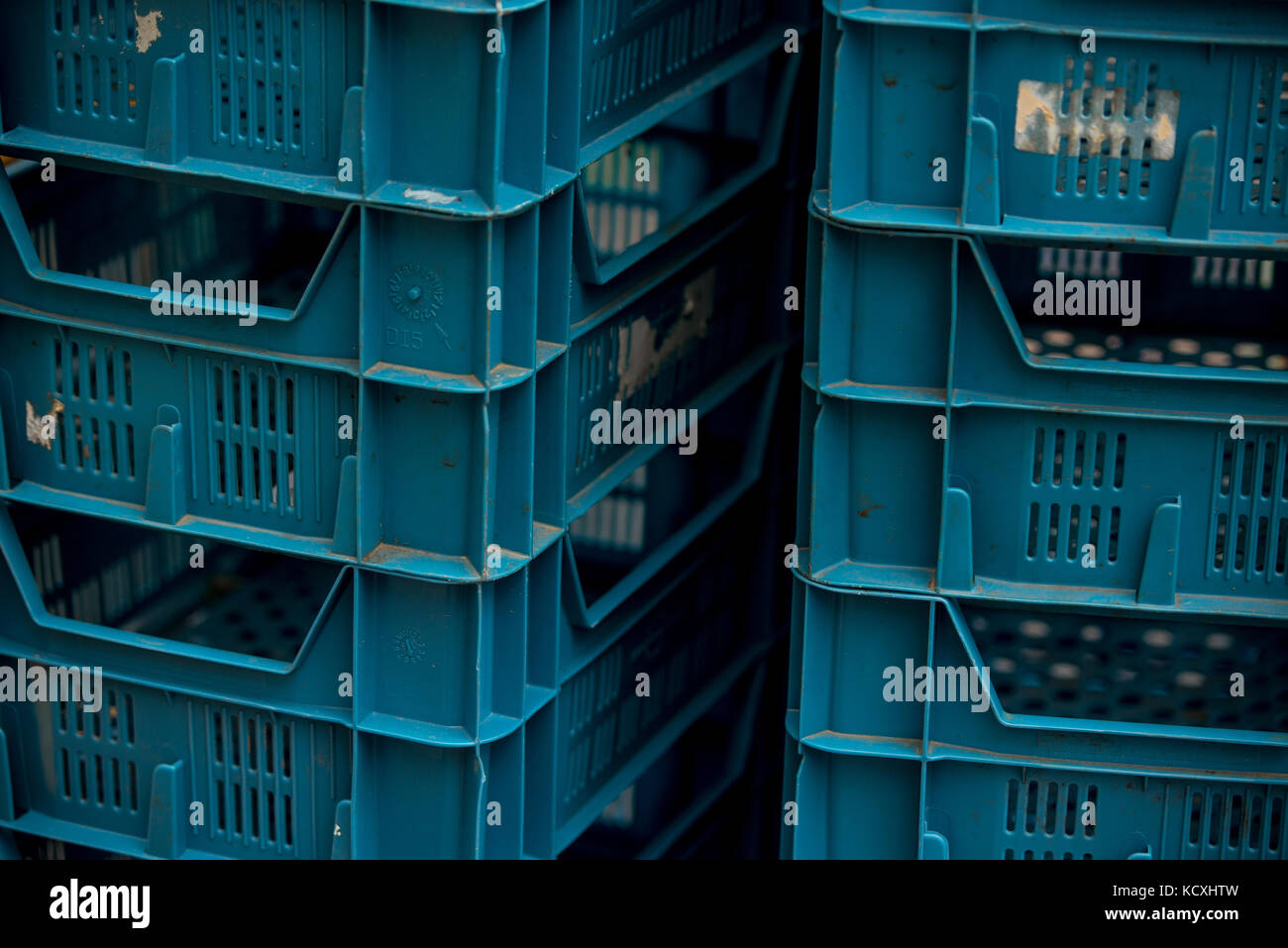 Stack of crates for groceries on a market Stock Photo - Alamy