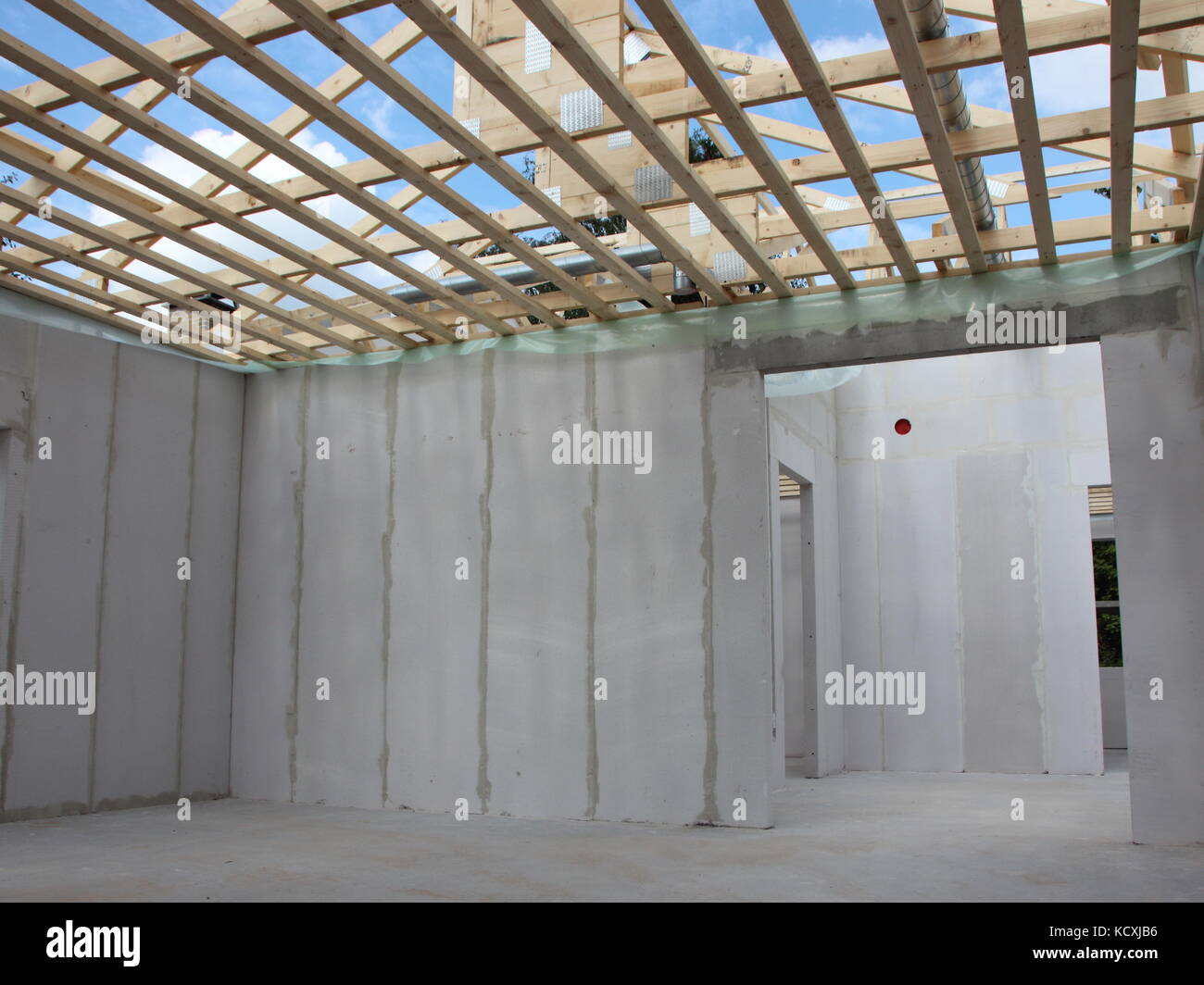 Inside New Constructed Unfinished Home with Roof Rafter Stock Photo - Alamy