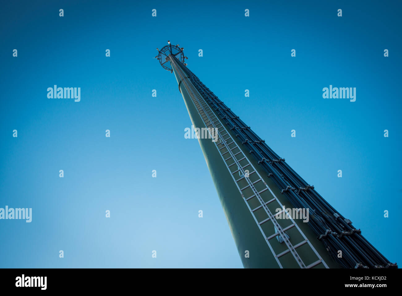 Cell phone cellular transmission tower blue sky Stock Photo - Alamy