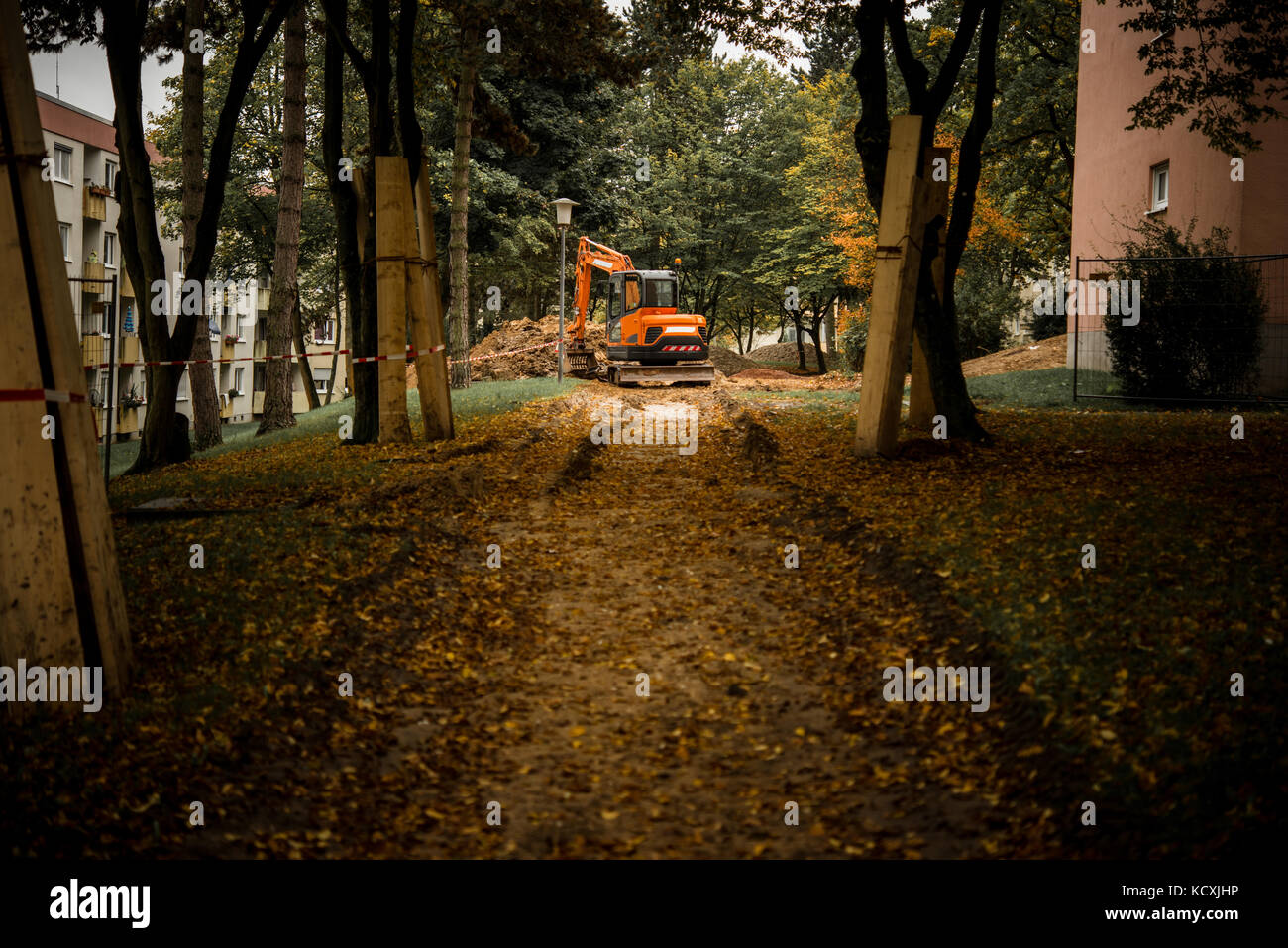 construction site in autumn with a crawler Stock Photo - Alamy
