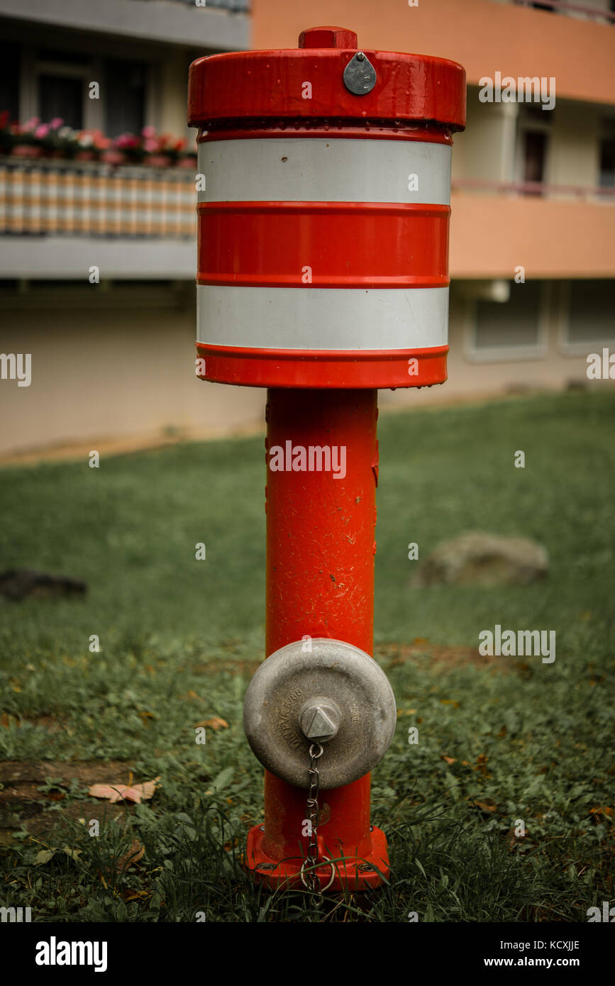 Red and white stripes fire hydrant water Stock Photo - Alamy