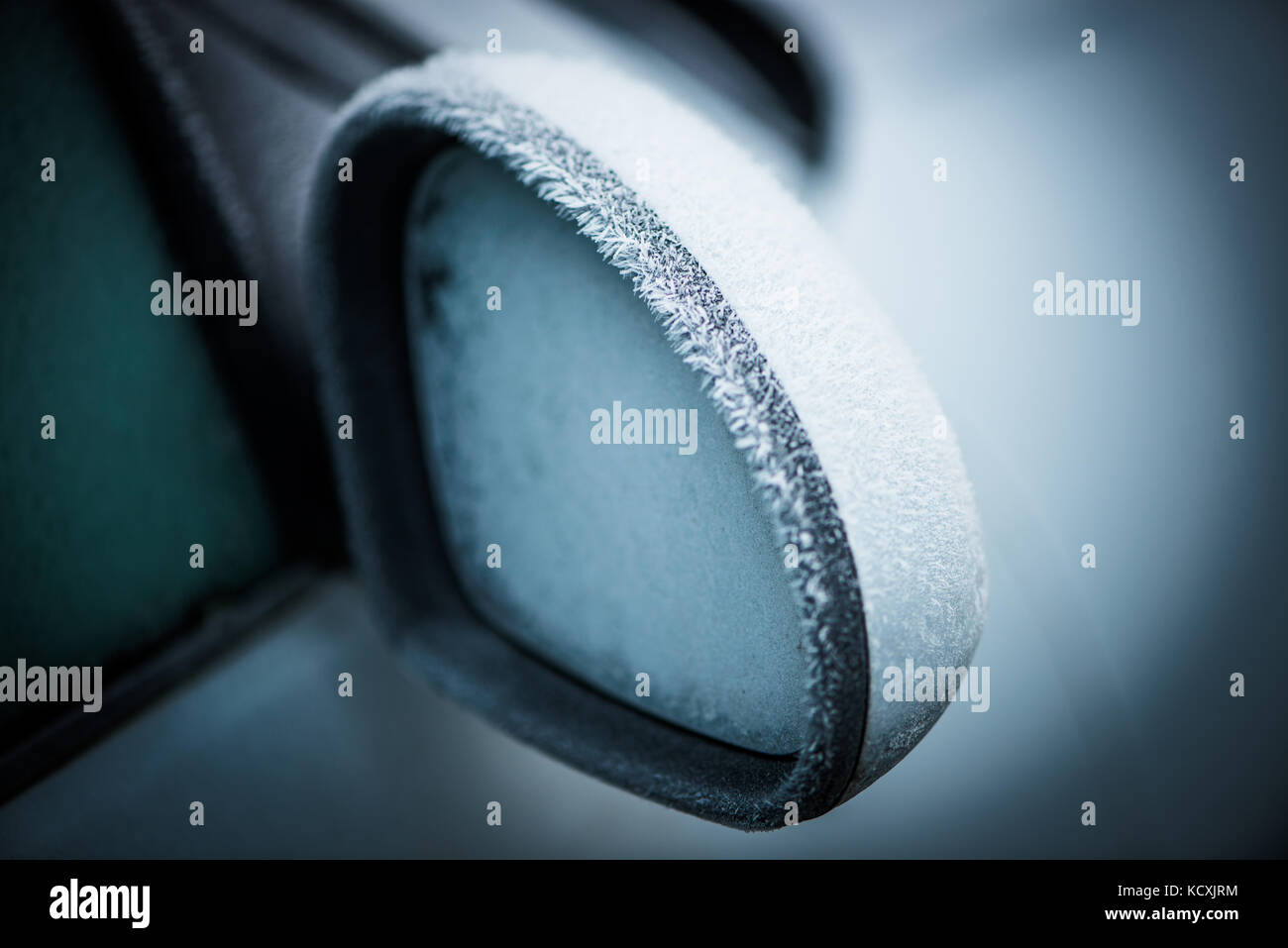 Frost iced mirror of a car in winter with ice crystals Stock Photo - Alamy