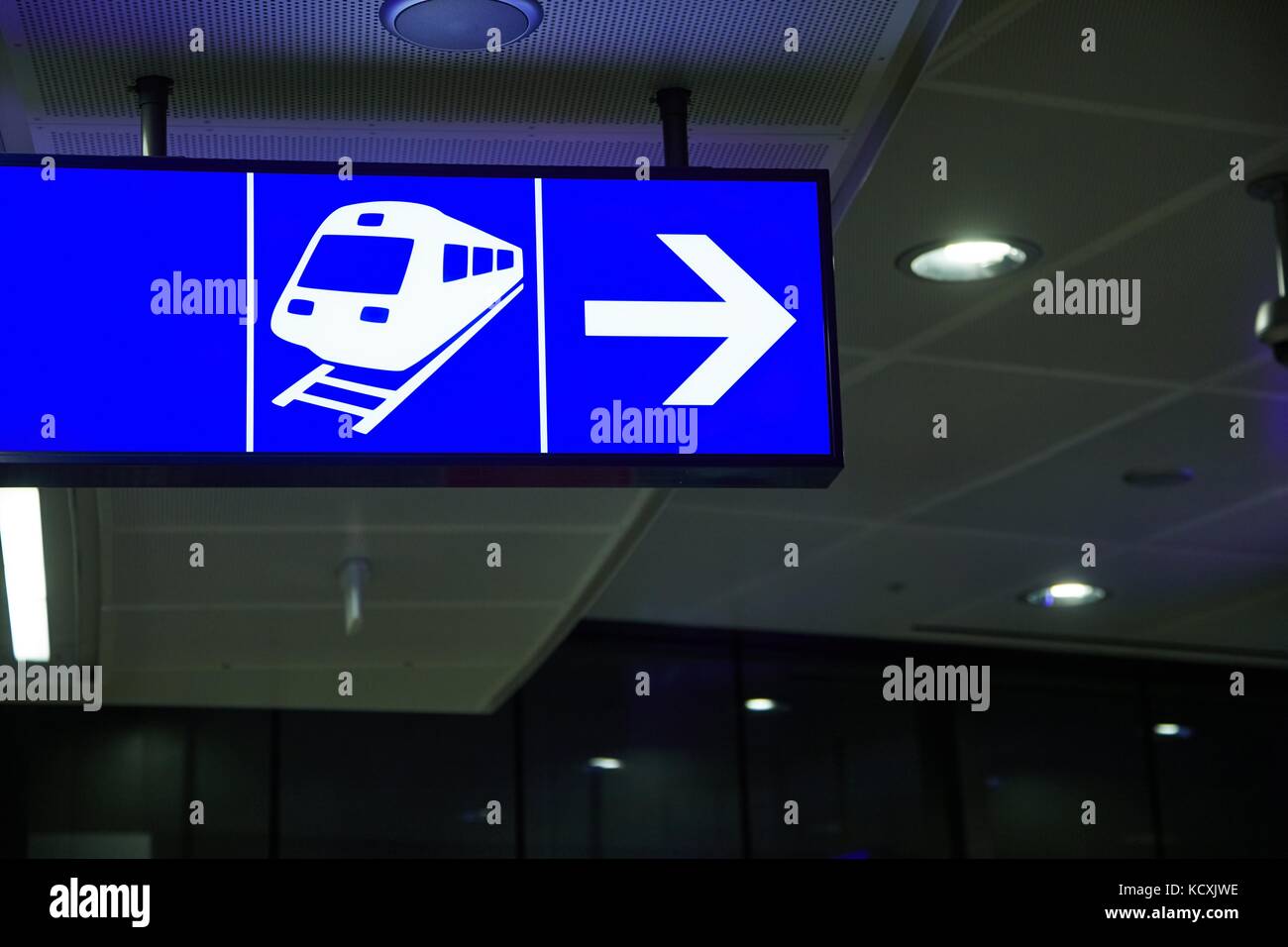 Train direction sign Stock Photo - Alamy