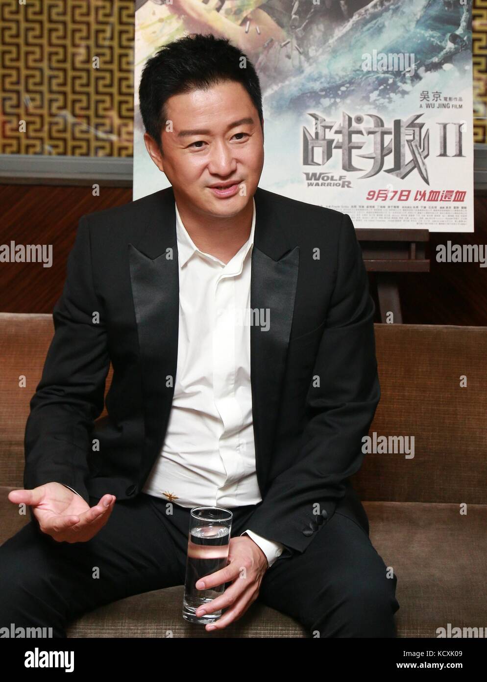 Chinese Actor And Director Wu Jing Left Chinese American Actress Celina Jade Pose During A