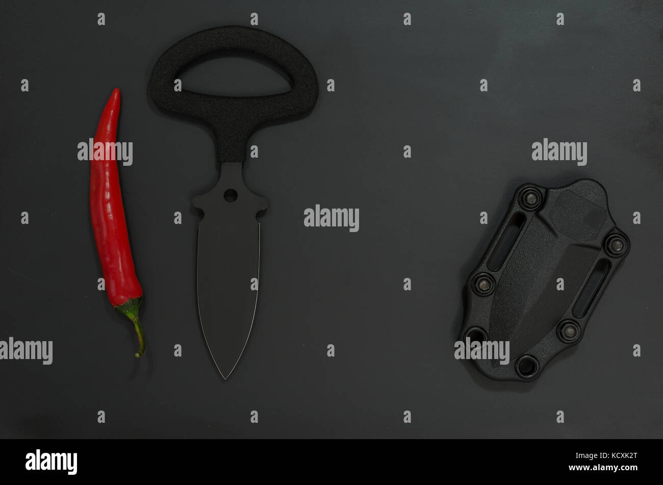 A plenty strong dagger style blade design. Red pepper and plastic ...