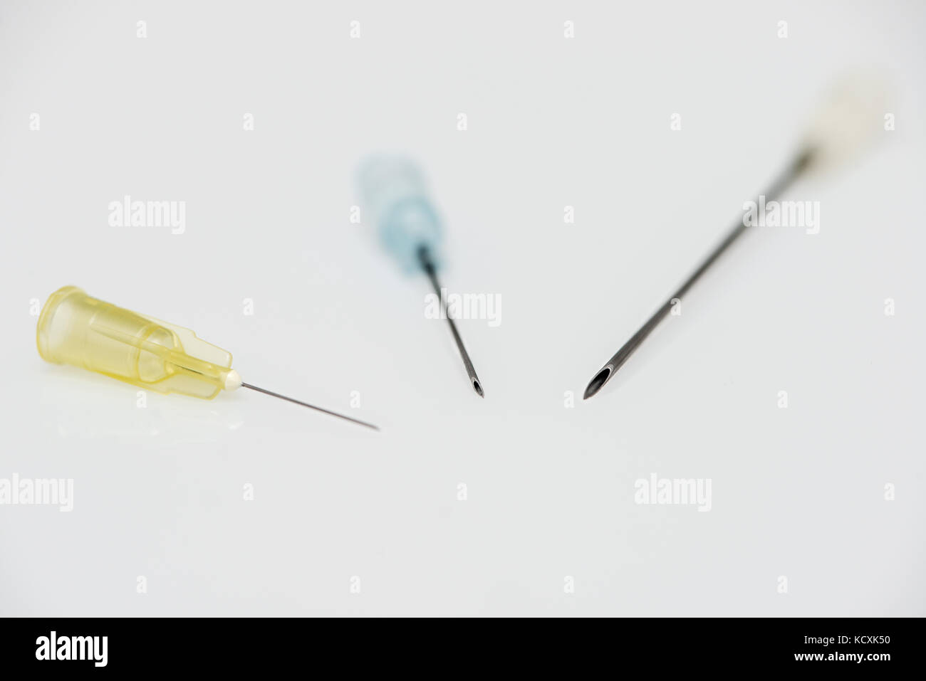 Three needles cannulas macro Stock Photo - Alamy