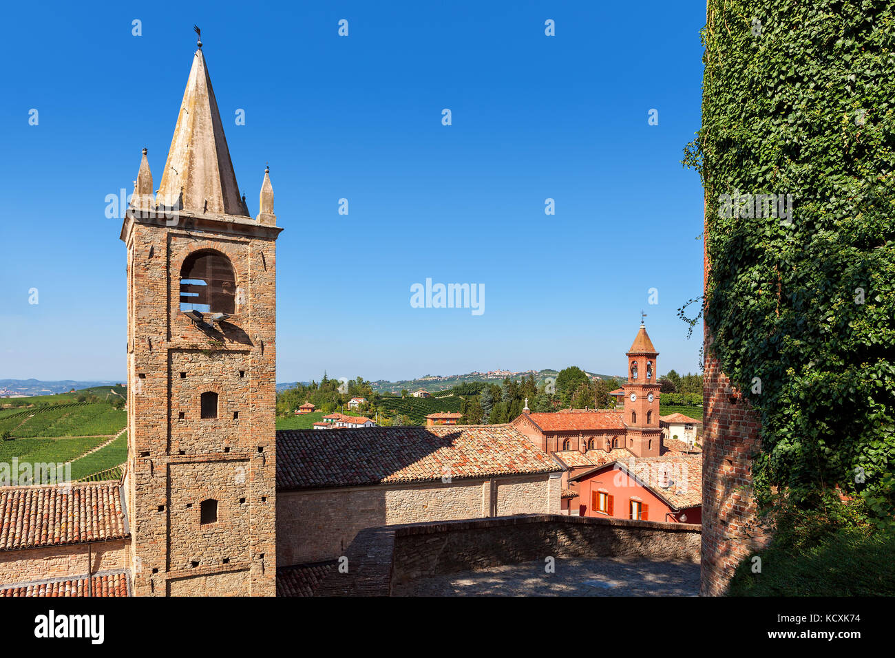 Old houses and belfries in small italian town of Serralunga d'Alba in ...