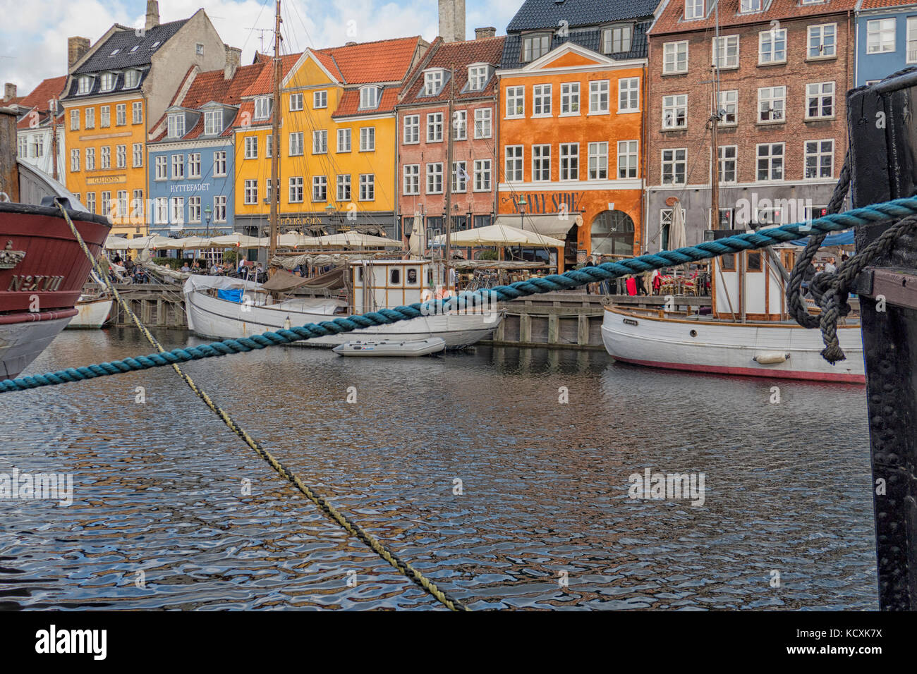 The Nyhavn Canal in Copenhagen, Denmark is a popular tourist ...