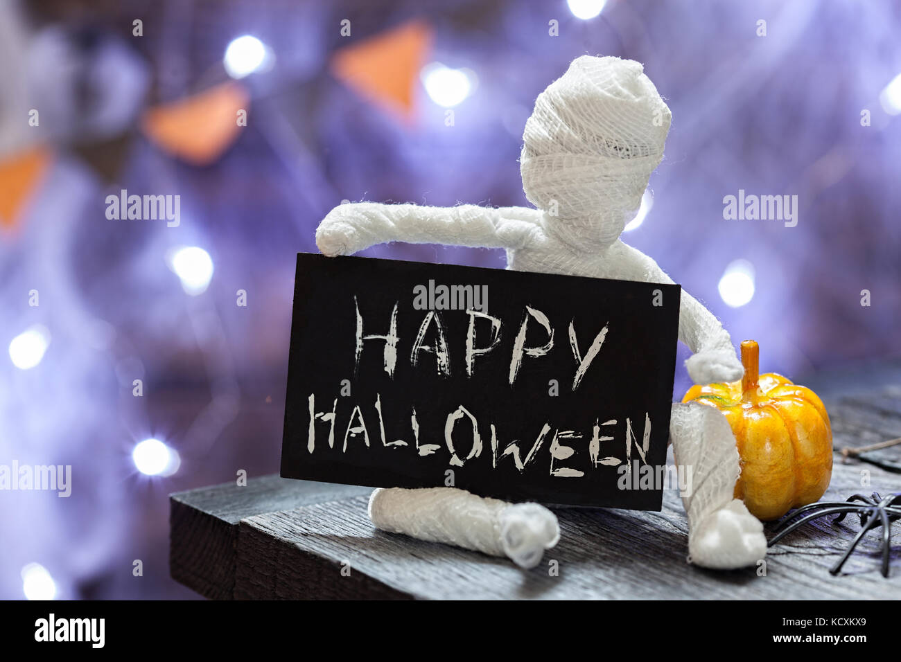 Cute funny mummy. Halloween decoration on table Stock Photo - Alamy