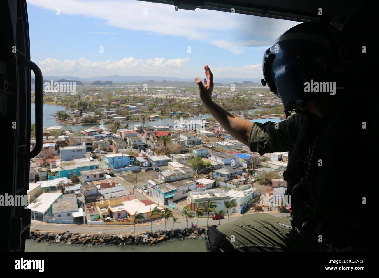 U.S. Coast Guard Petty Officer 2nd Class Ronald Carrasquillo, assigned ...