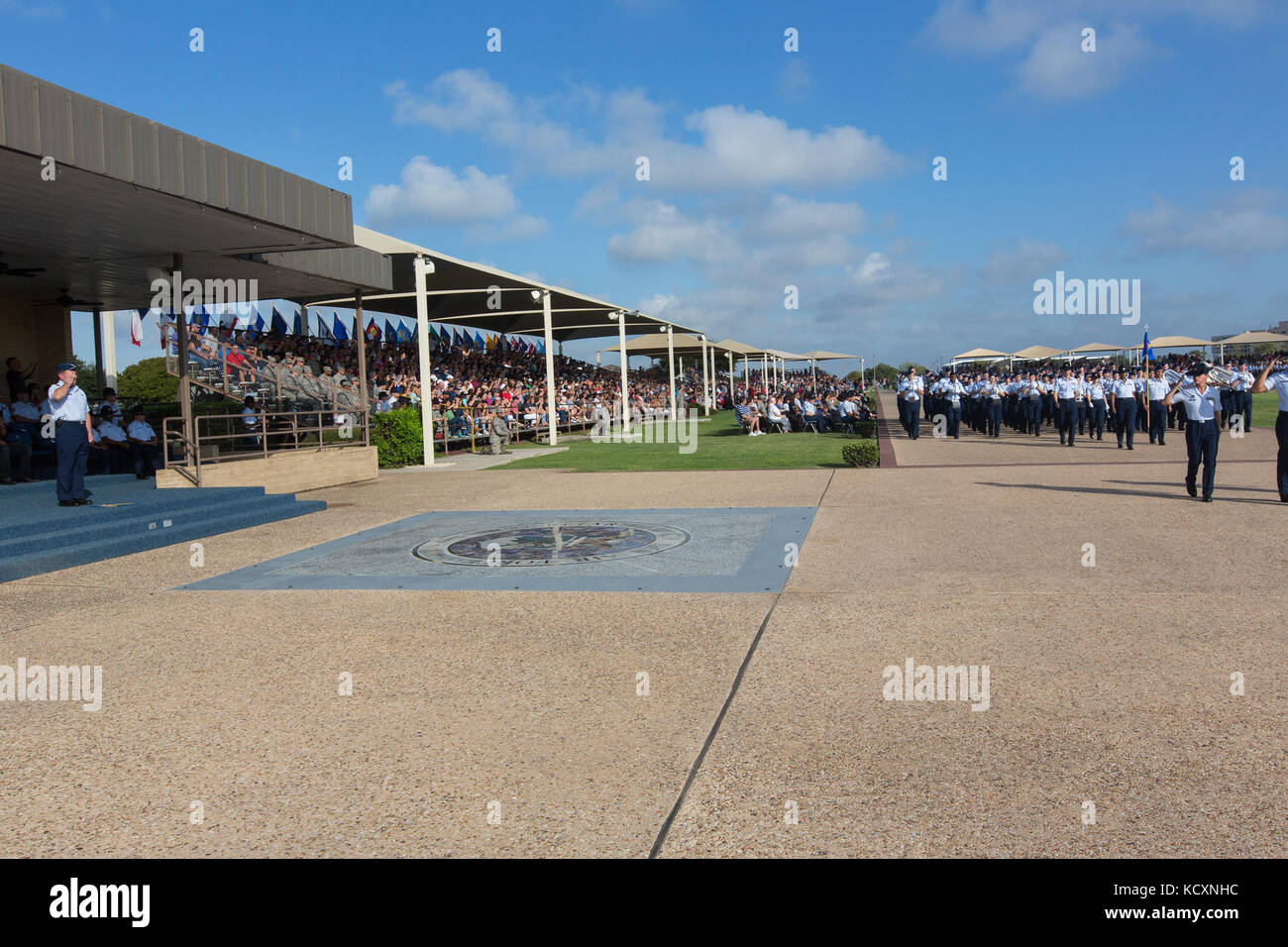 Maj. Gen. Timothy J. Leahy (left), Second Air Force commander, renders ...