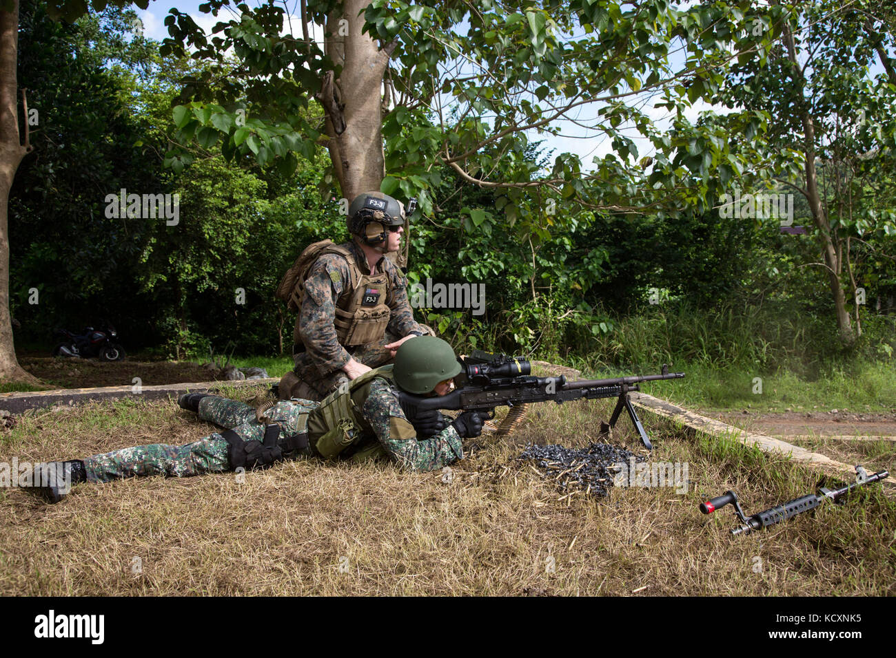 A U.S. Reconnaissance Marine with the Maritime Raid Force, 31st Marine Expeditionary Unit, and a ...