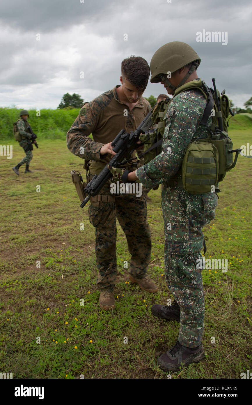 A U.S. Reconnaissance Marine with the Maritime Raid Force, 31st Marine Expeditionary Unit ...