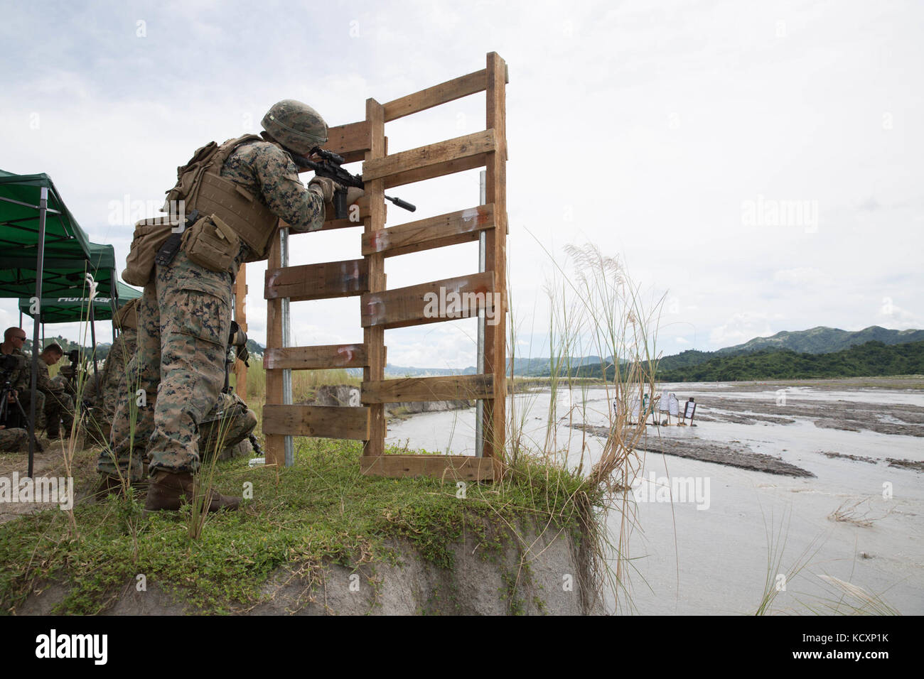 U.S. Marine Cpl. Joshua Wiggins, a mortarman with Weapons Company ...