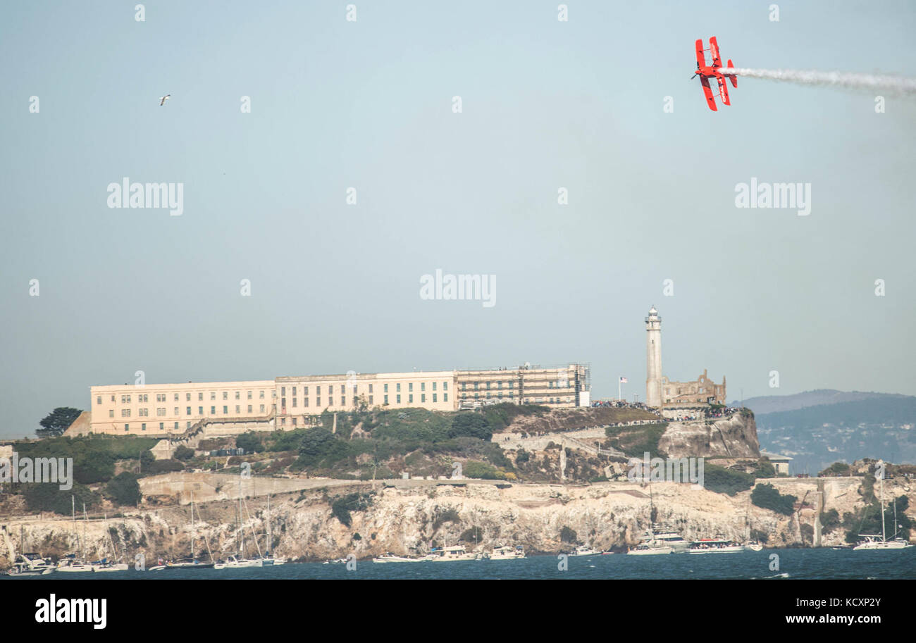Sean D. Tucker and Team Oracle fly over Alcatraz during the San ...