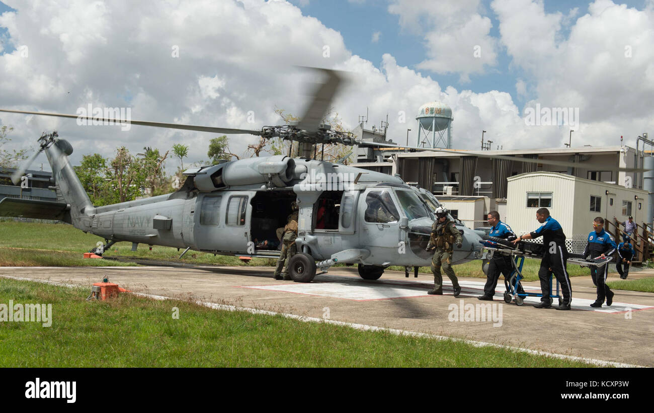 Crew members helicopter sea hi-res stock photography and images - Alamy