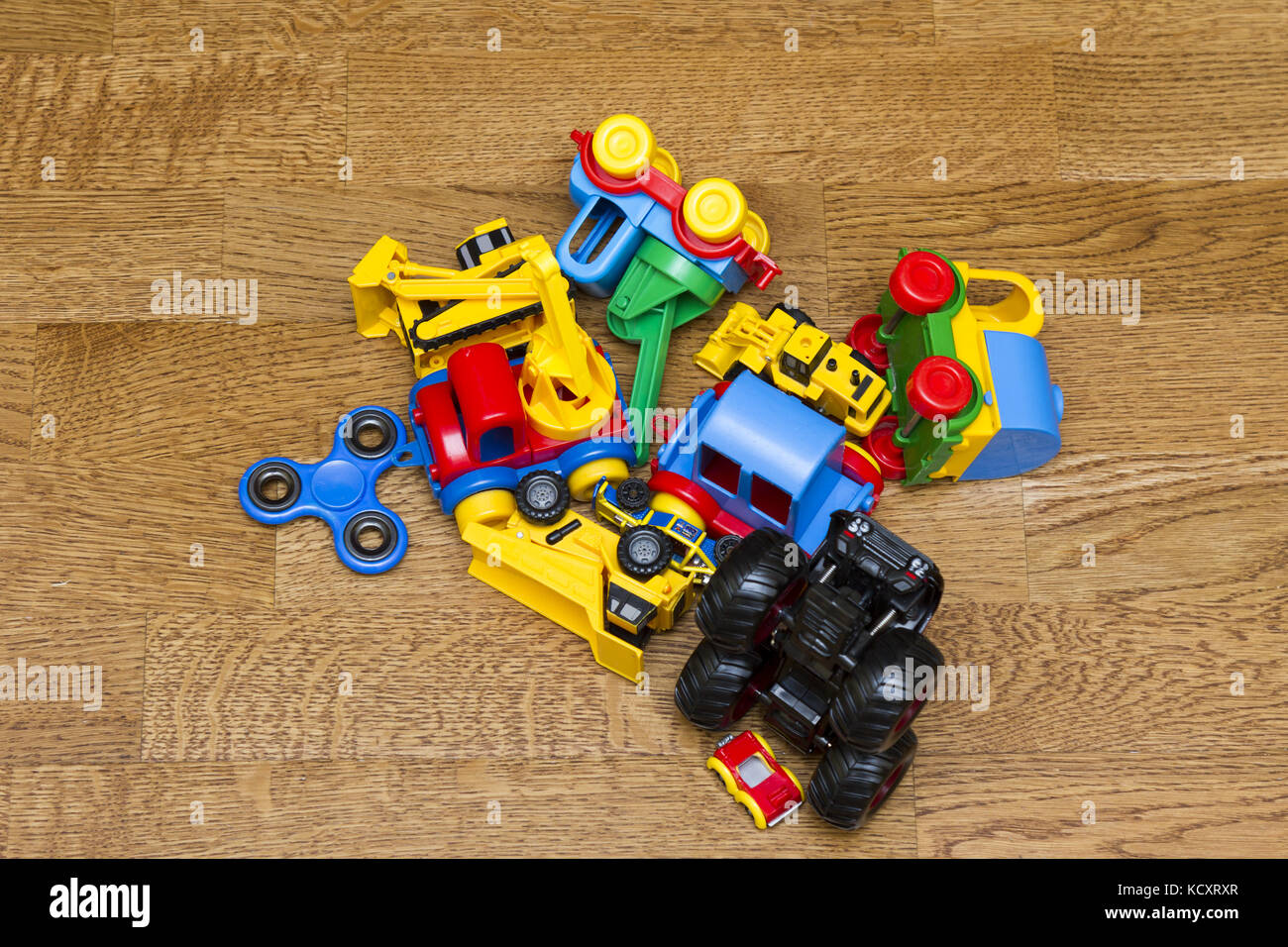 Children's toys lying on the floor Stock Photo - Alamy