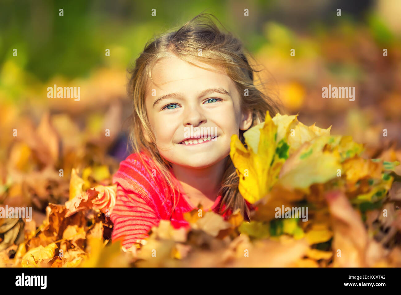 Child autumn leaves hi-res stock photography and images - Alamy