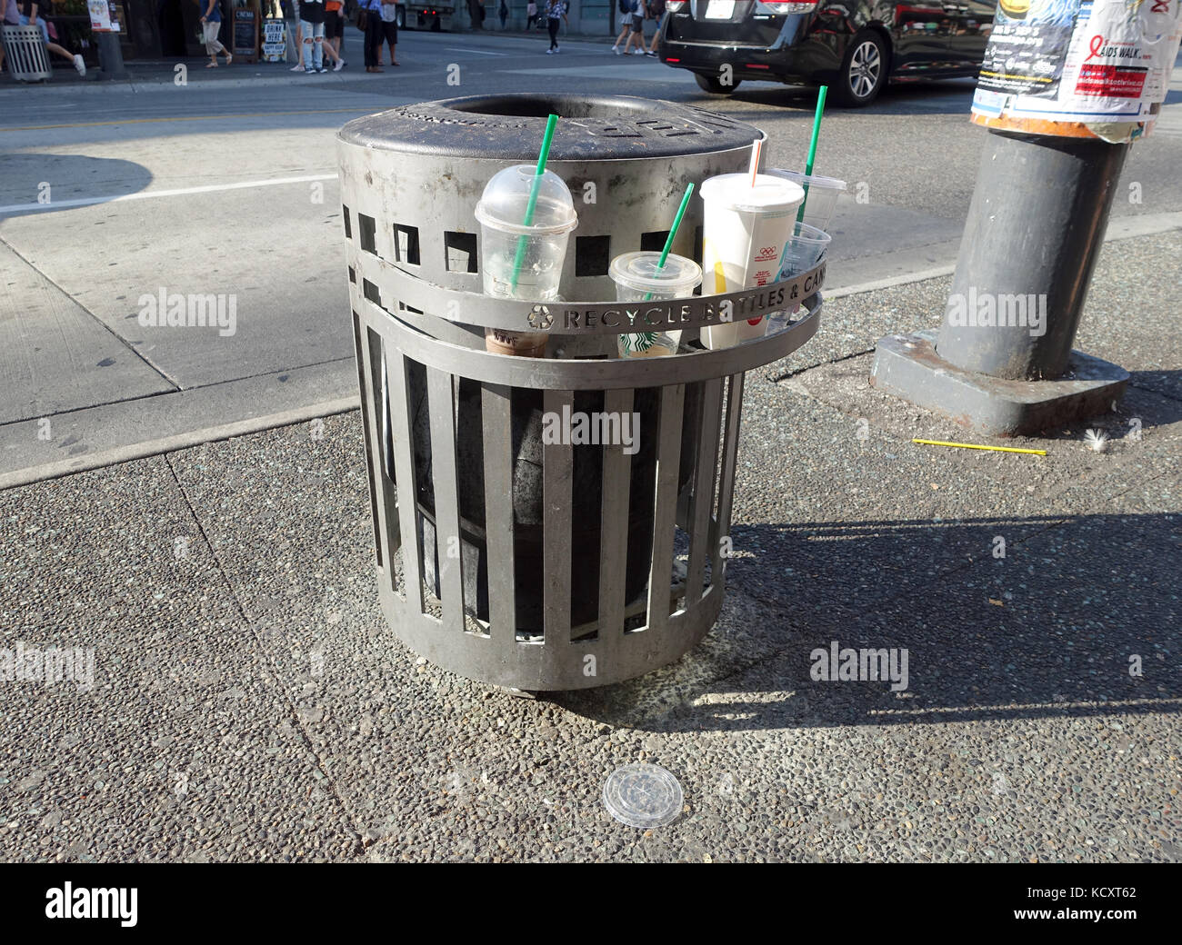 Different kinds of one-way cups can be seen in the intended holder of a ...